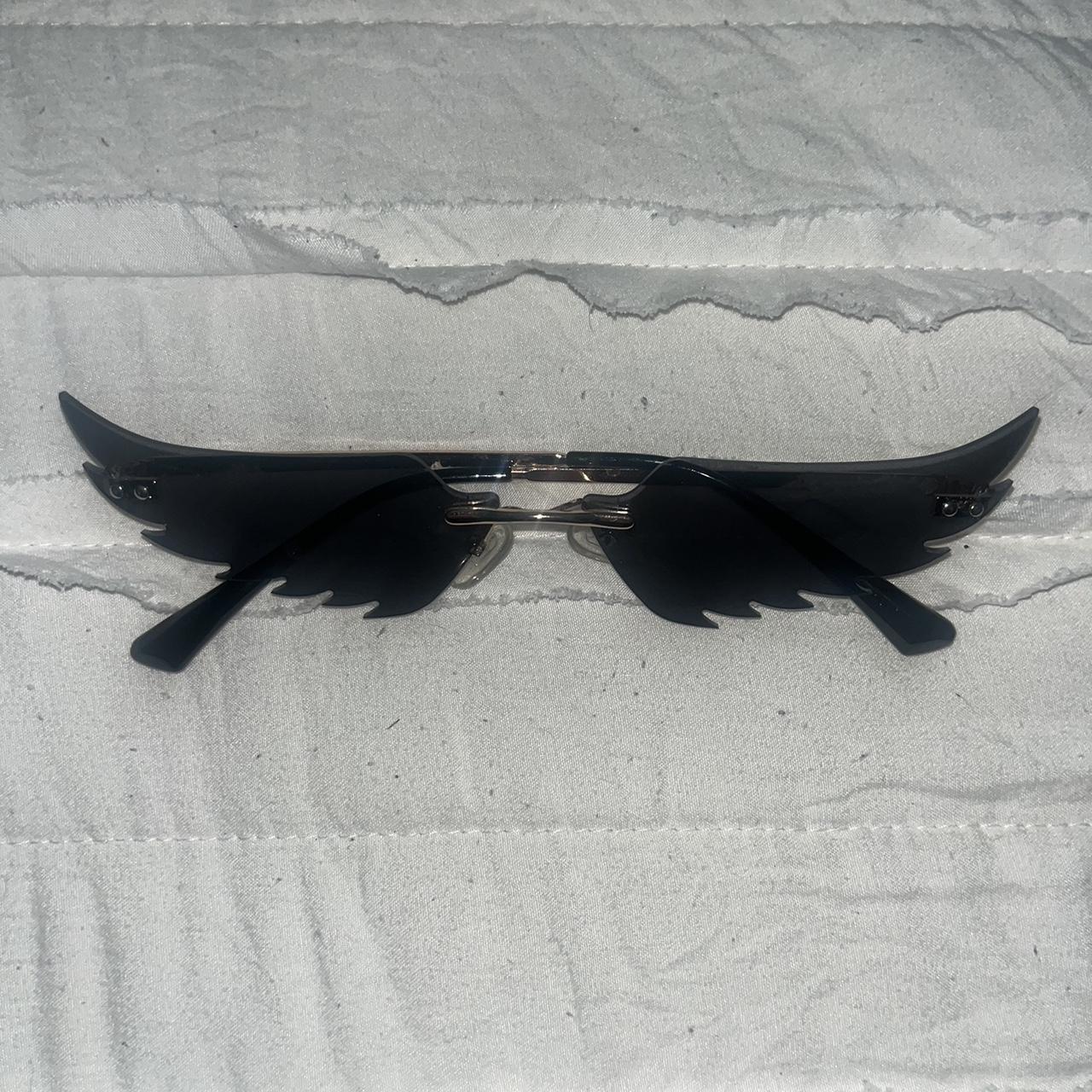 Black wing glasses - Depop