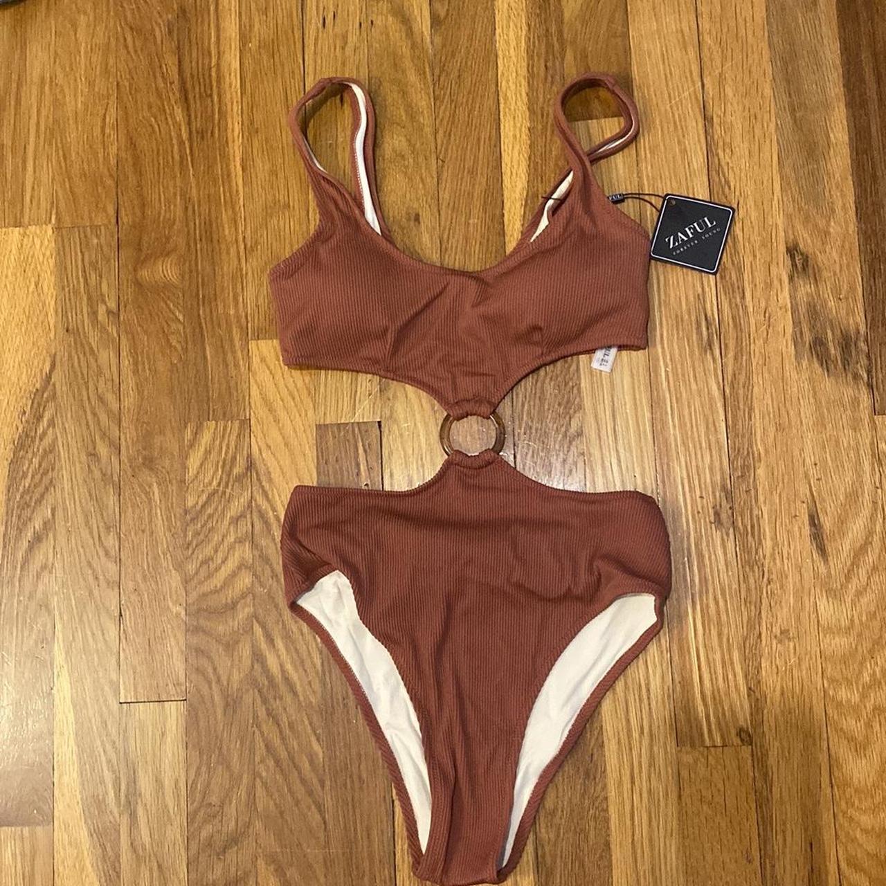 Size 4 One piece ribbed Zaful swimsuit. Never worn - Depop