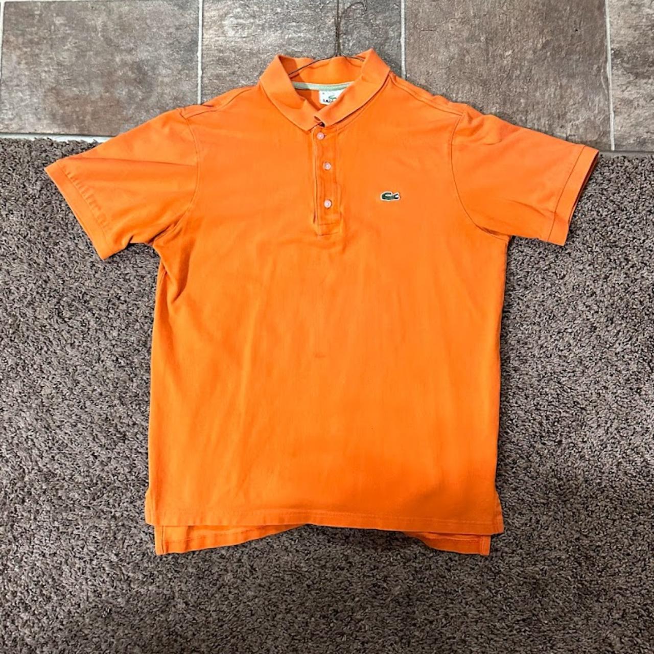 Orange Lacoste Polo Size: Small - Depop