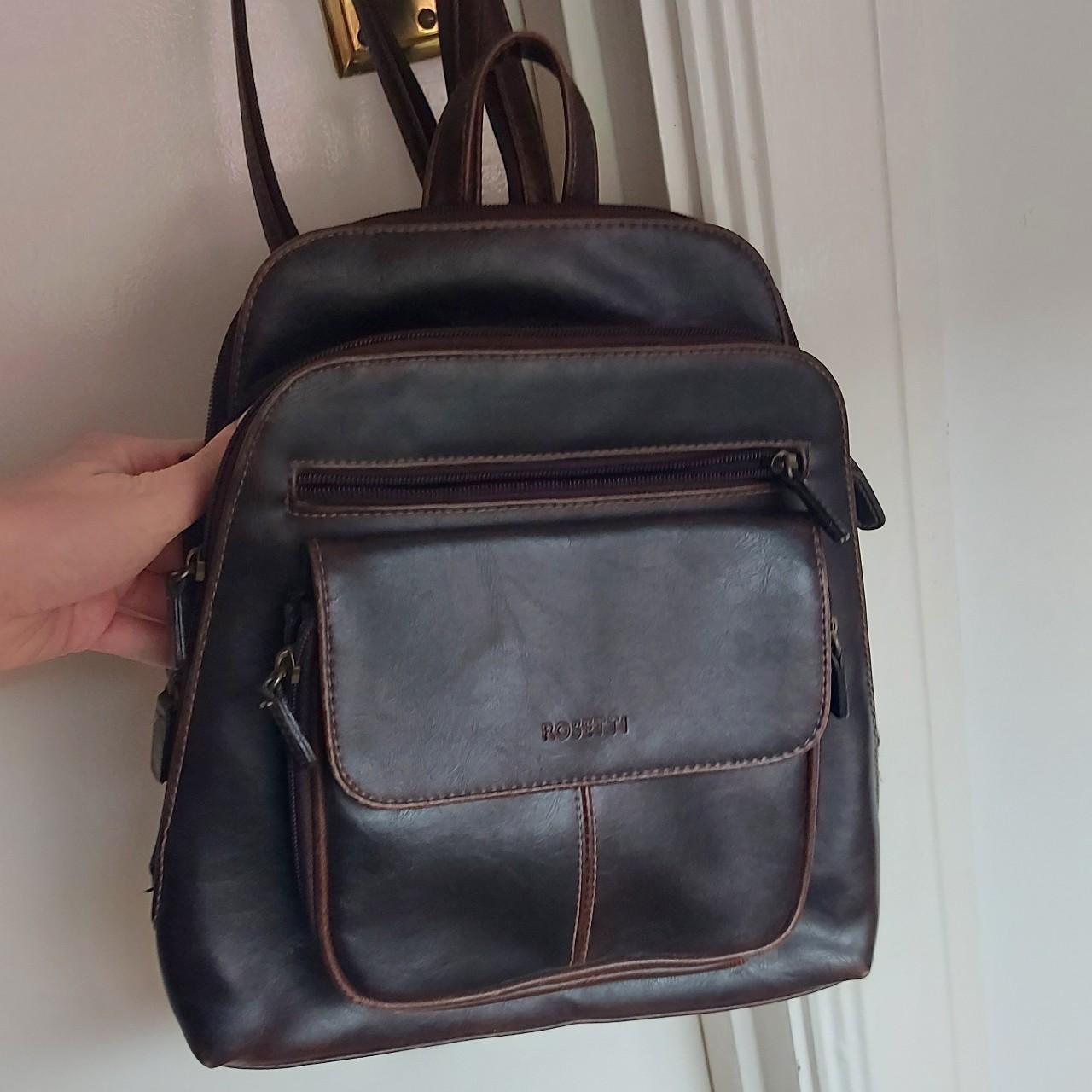 Beautiful brown backpack. Small-medium sized, zip... - Depop