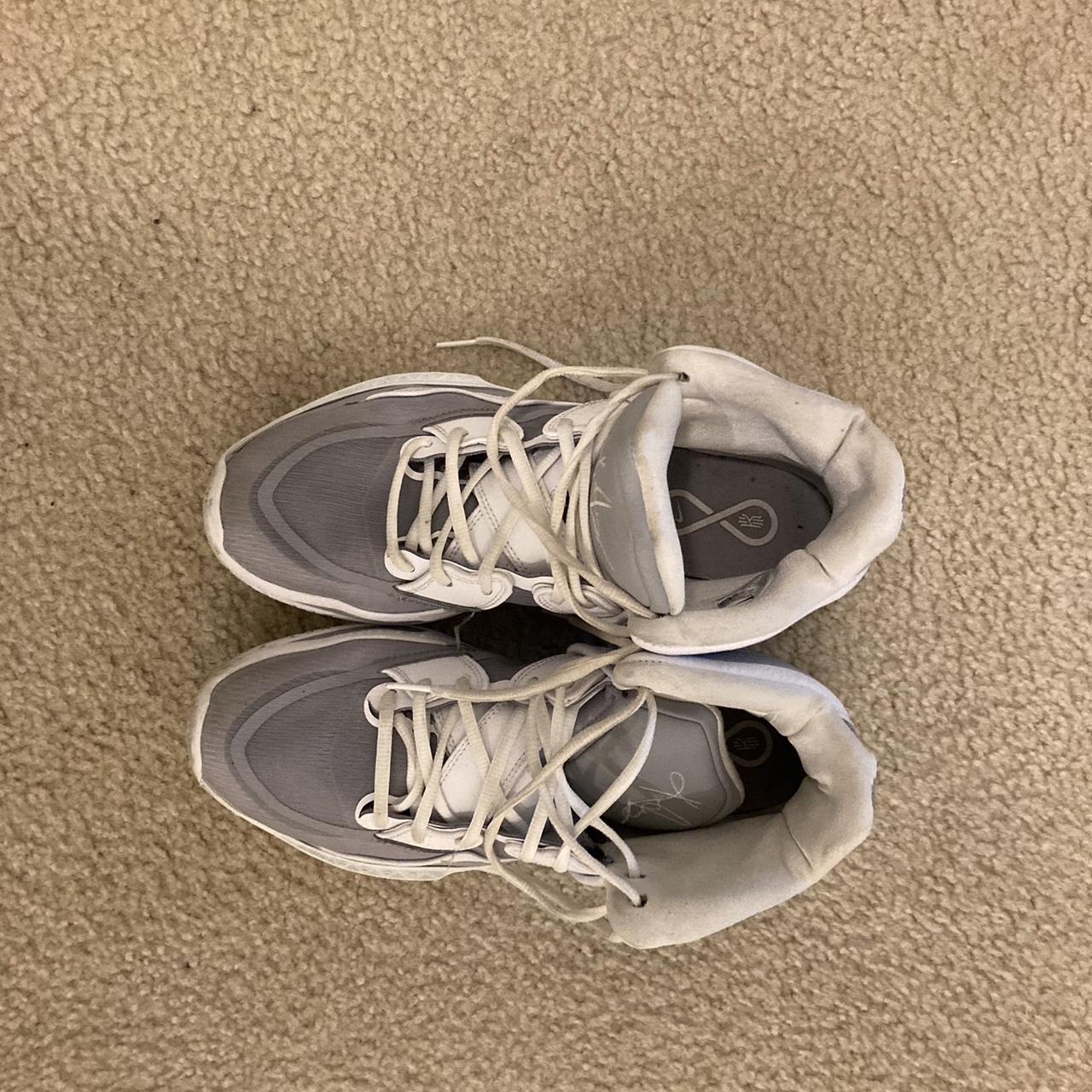 Kyrie Infinity grey and white size 12 - Depop