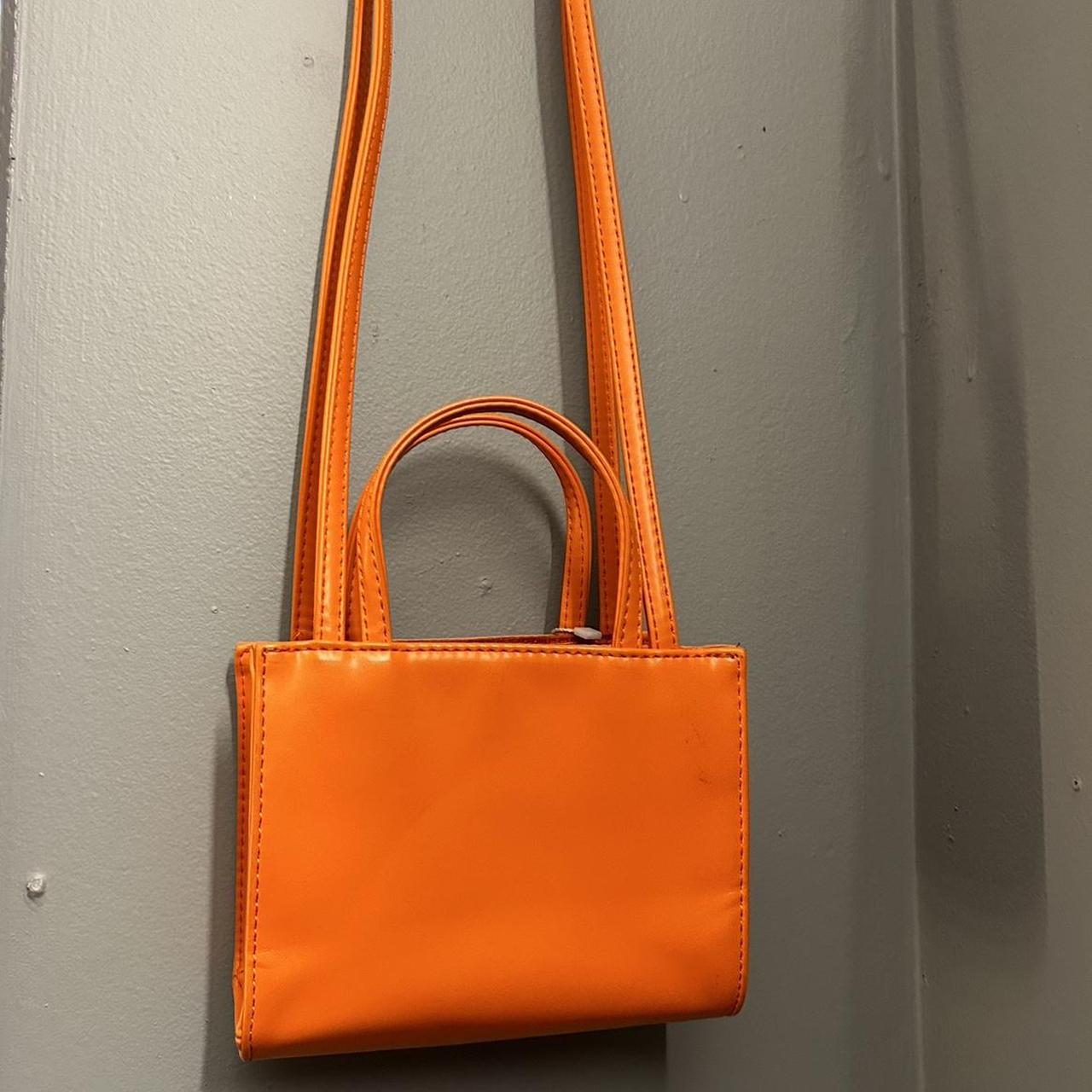 Small Orange Telfar Worn a few Times but still has... - Depop