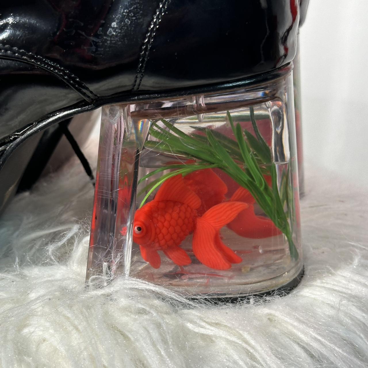 Black platform shoes with fish tank bottoms would... - Depop