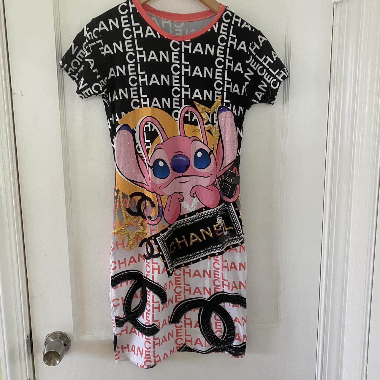 Brand new Beautiful channel dress with Angel... - Depop