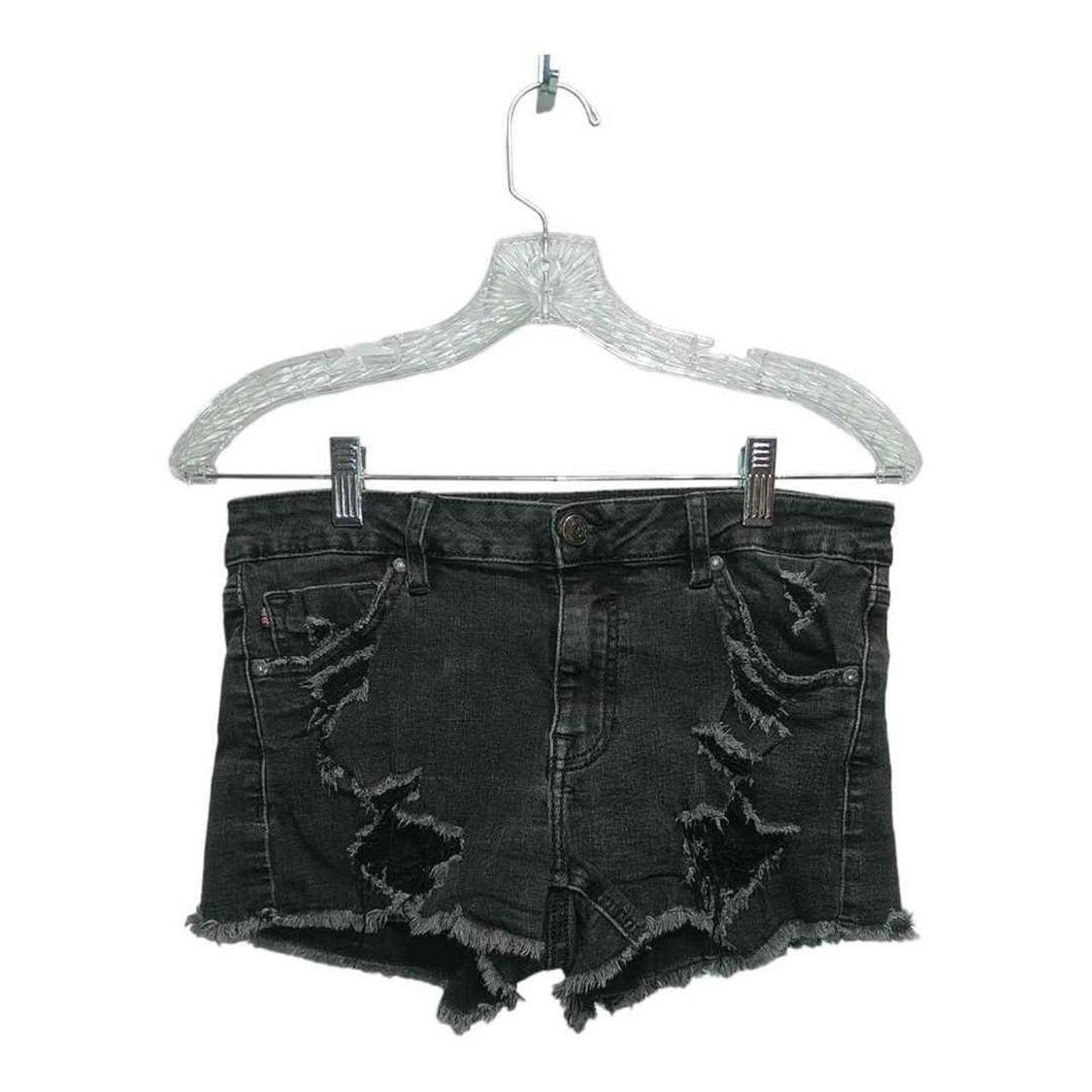 This very cute pair of distressed black shorts by... - Depop