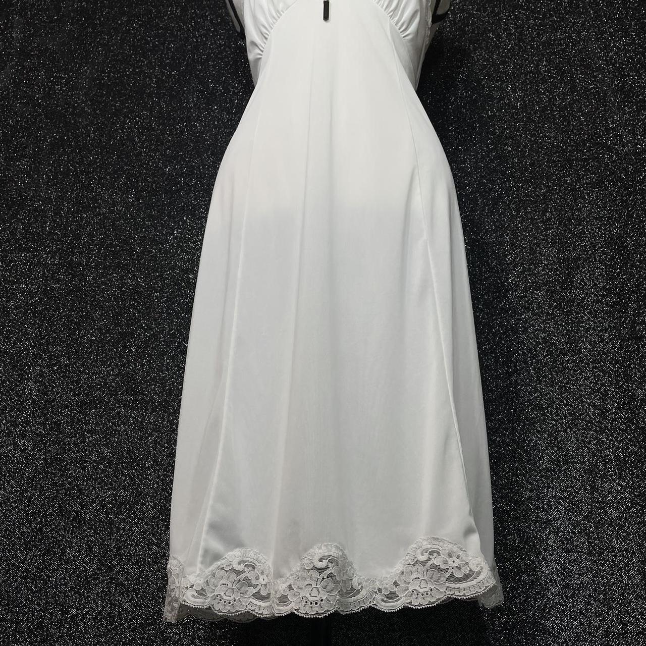 Vintage white slip dress. A vintage 70s slip by... - Depop