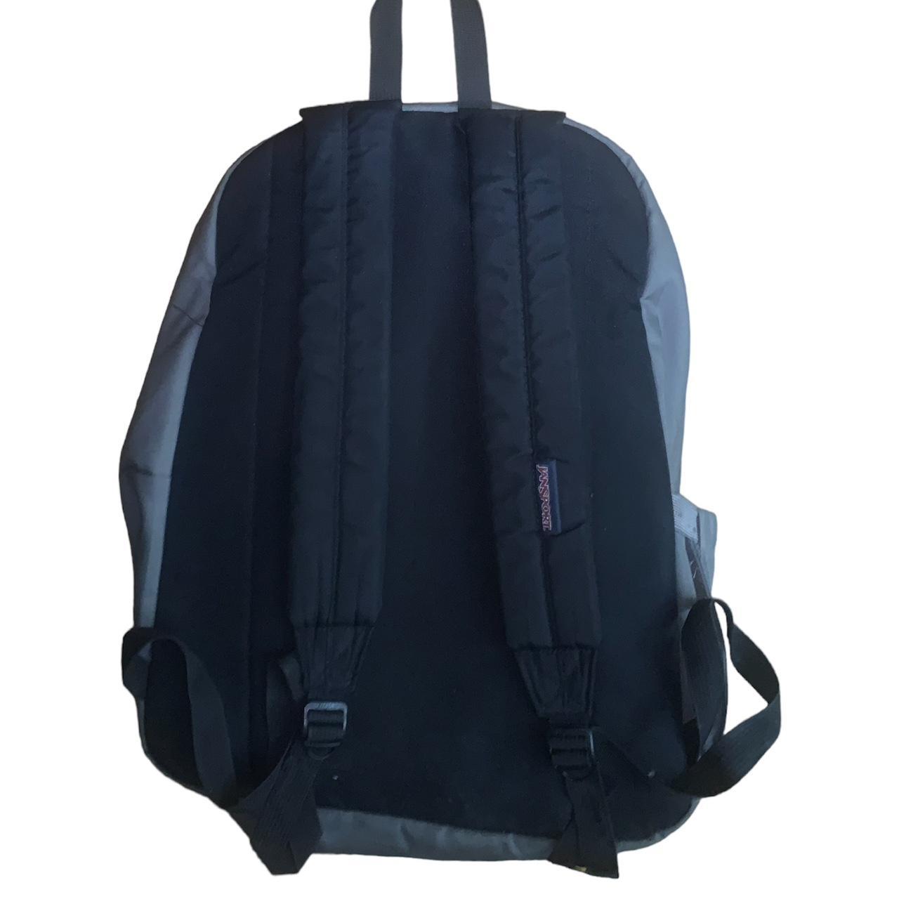 grey jansport backpack used for a while, but is in... - Depop
