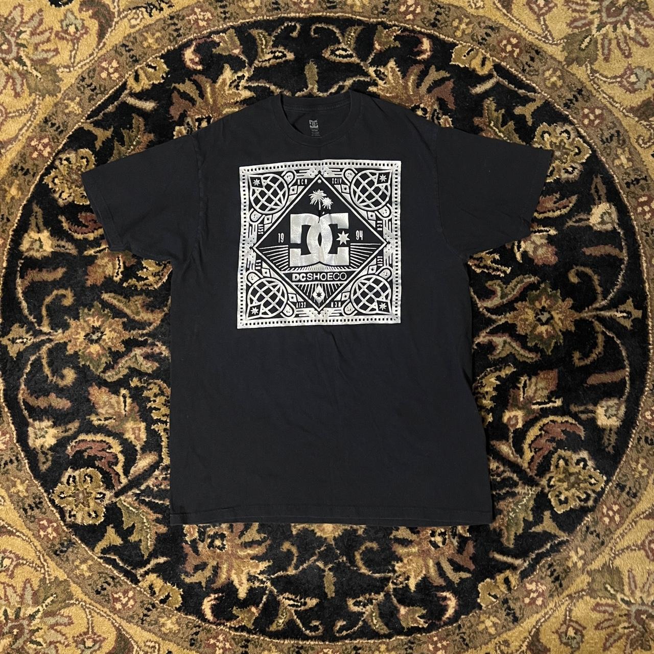 Y2K DC tee // hole in chest - Depop