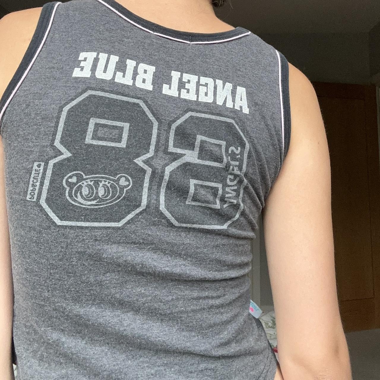 ⭐️authentic angel blue tank top⭐️ labelled as a M but... | Depop