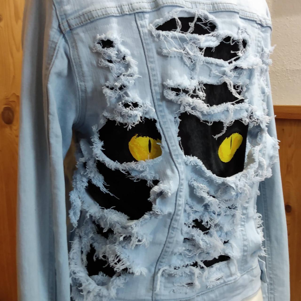 upcycled denim jacket with black cat eyes detail... - Depop