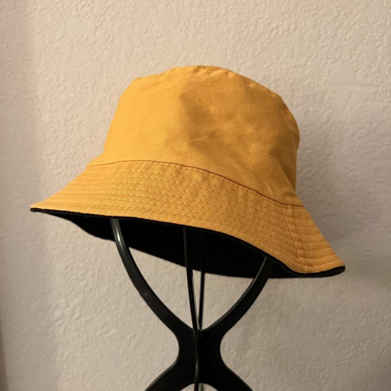 reversible black and mustard yellow bucket hat for a... - Depop