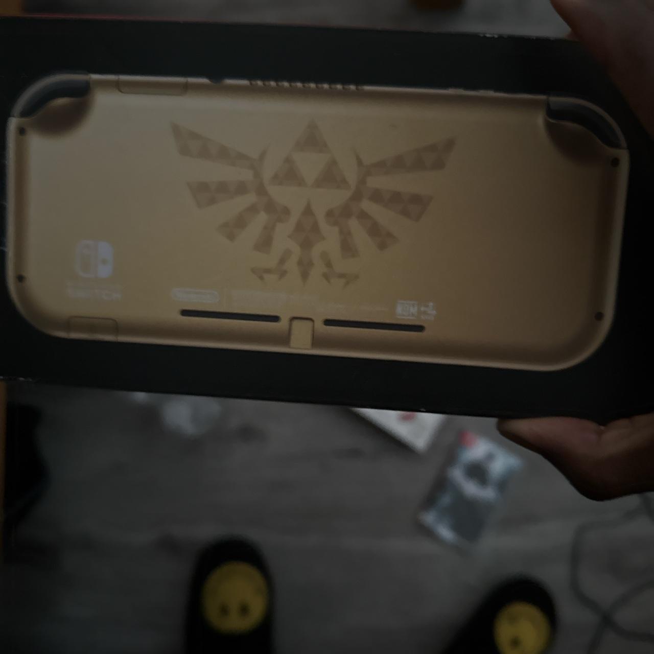 Nintendo switch gold lite unopened, with travel bag... | Depop