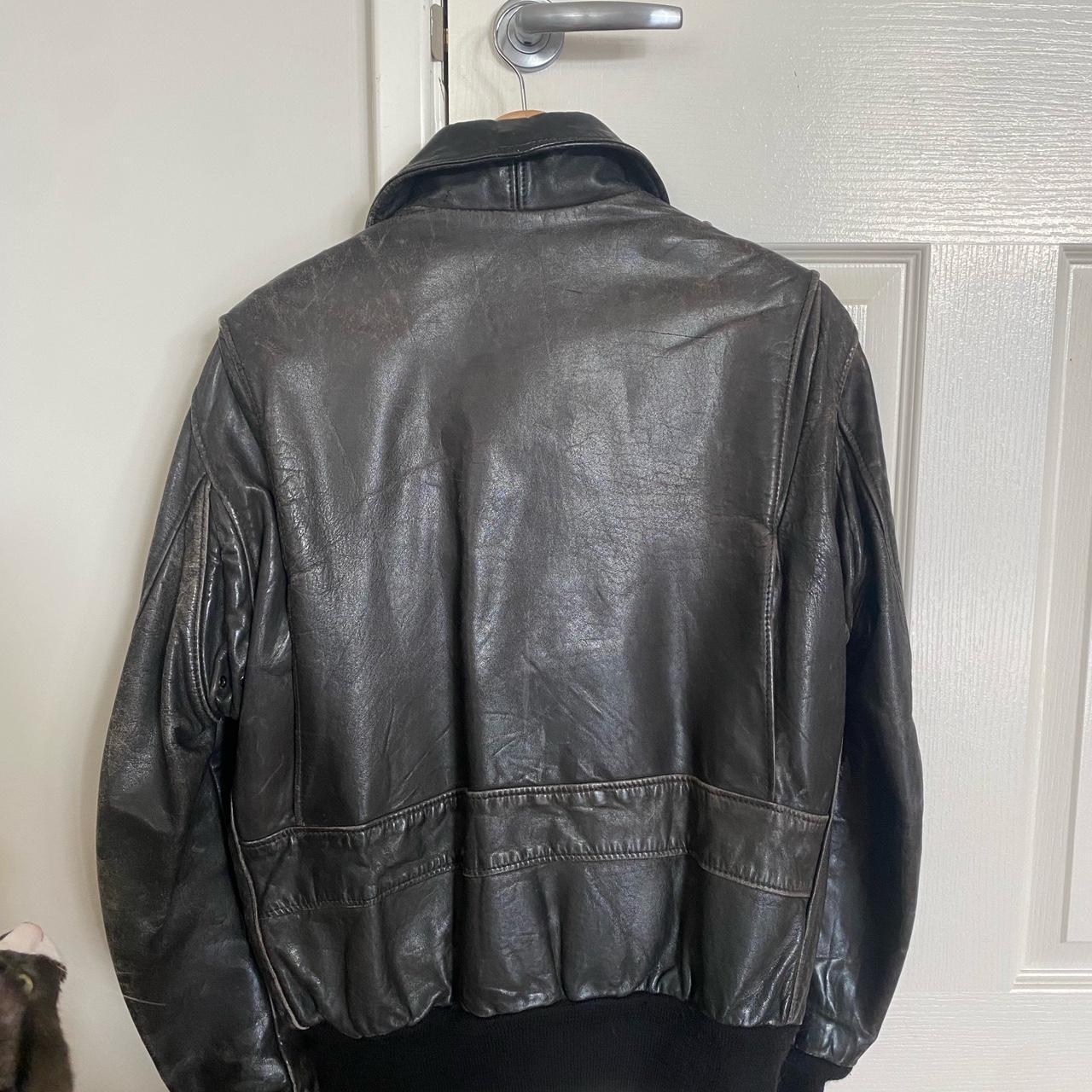 black heavy leather jacket sized 38 inside has a... - Depop