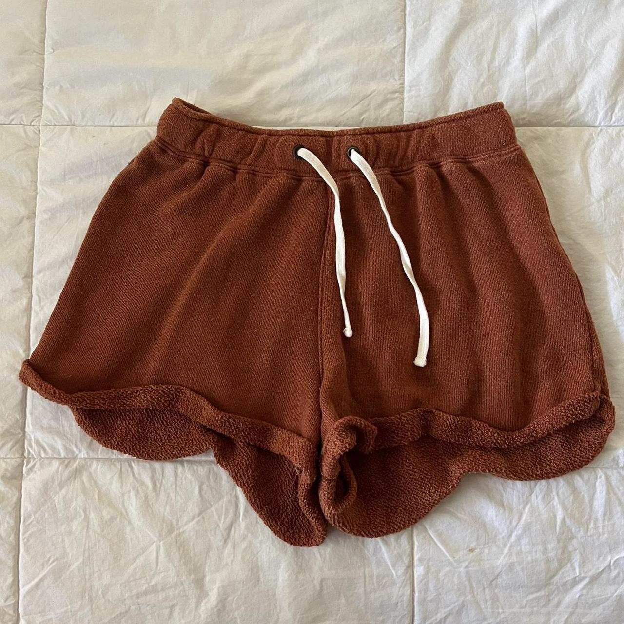 burnt orange shorts kind of beachy, can also be... - Depop