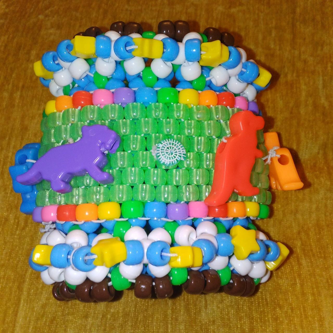 ROTATING KANDI DINOSAUR CUFF! the rotating piece... - Depop