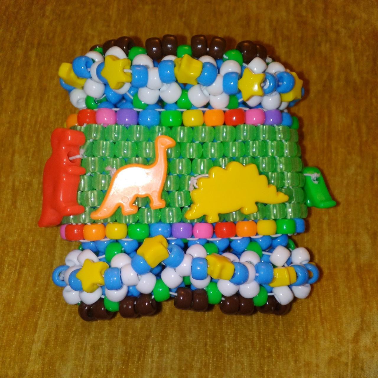 ROTATING KANDI DINOSAUR CUFF! the rotating piece... - Depop