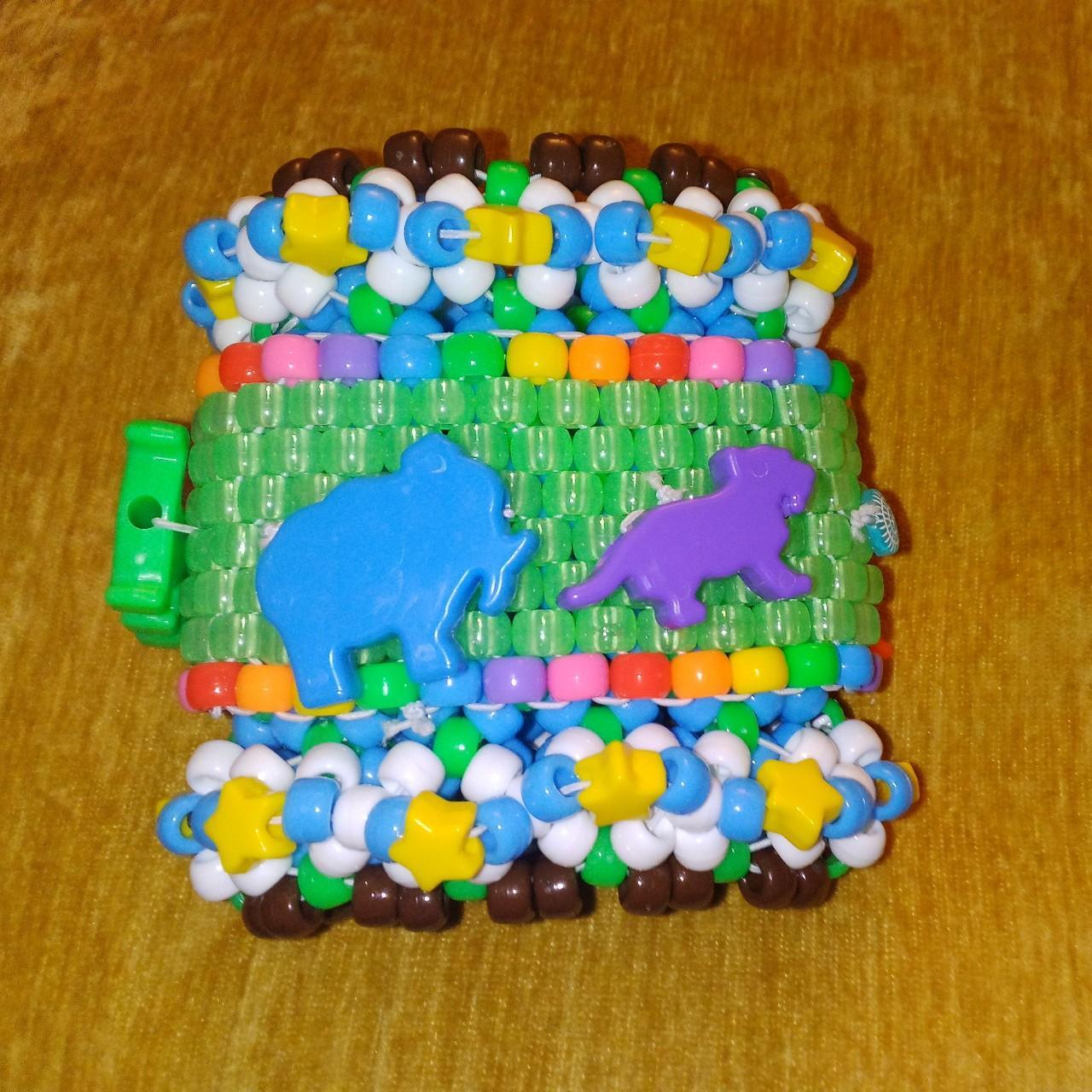 ROTATING KANDI DINOSAUR CUFF! the rotating piece... - Depop