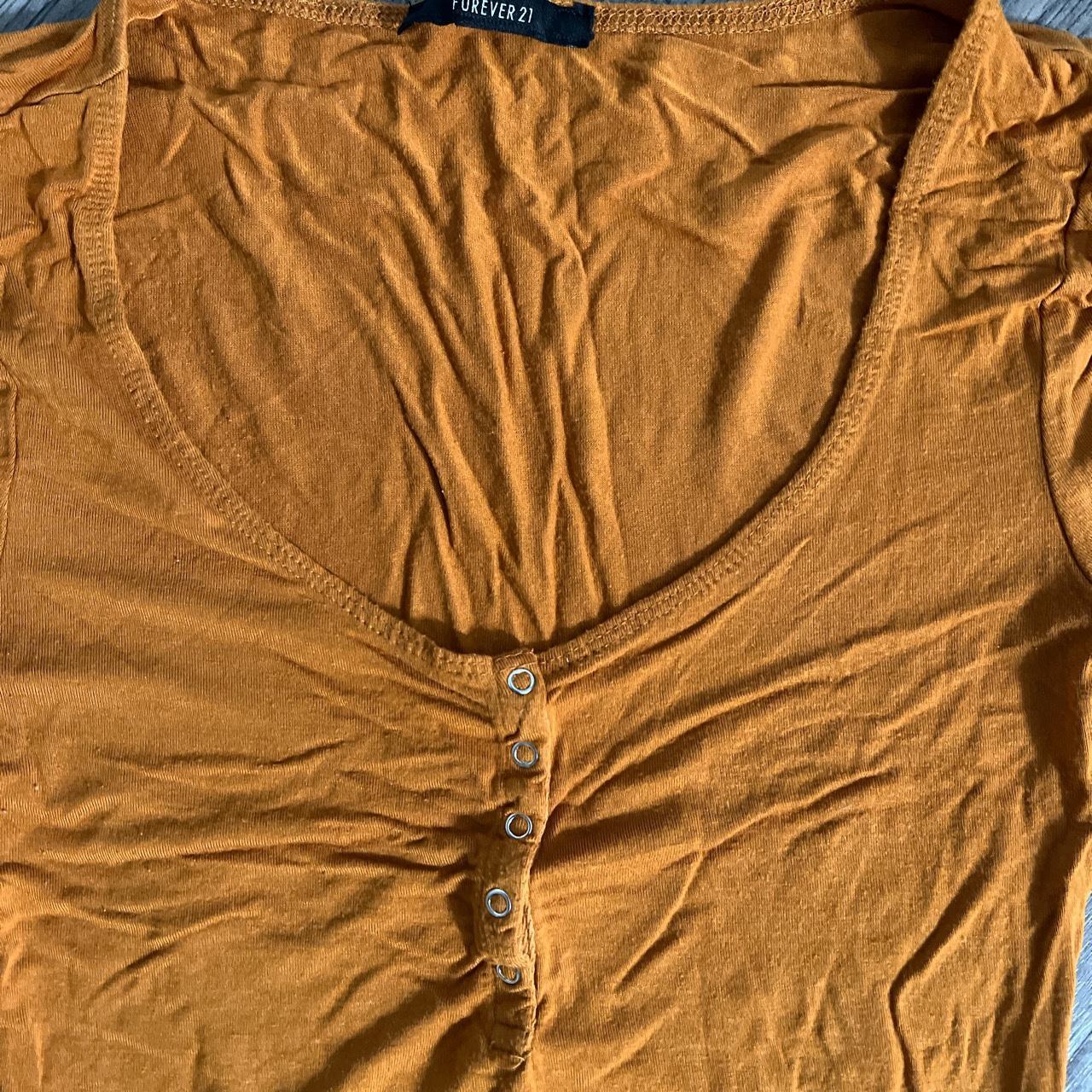 Burnt orange color body suit. - Depop