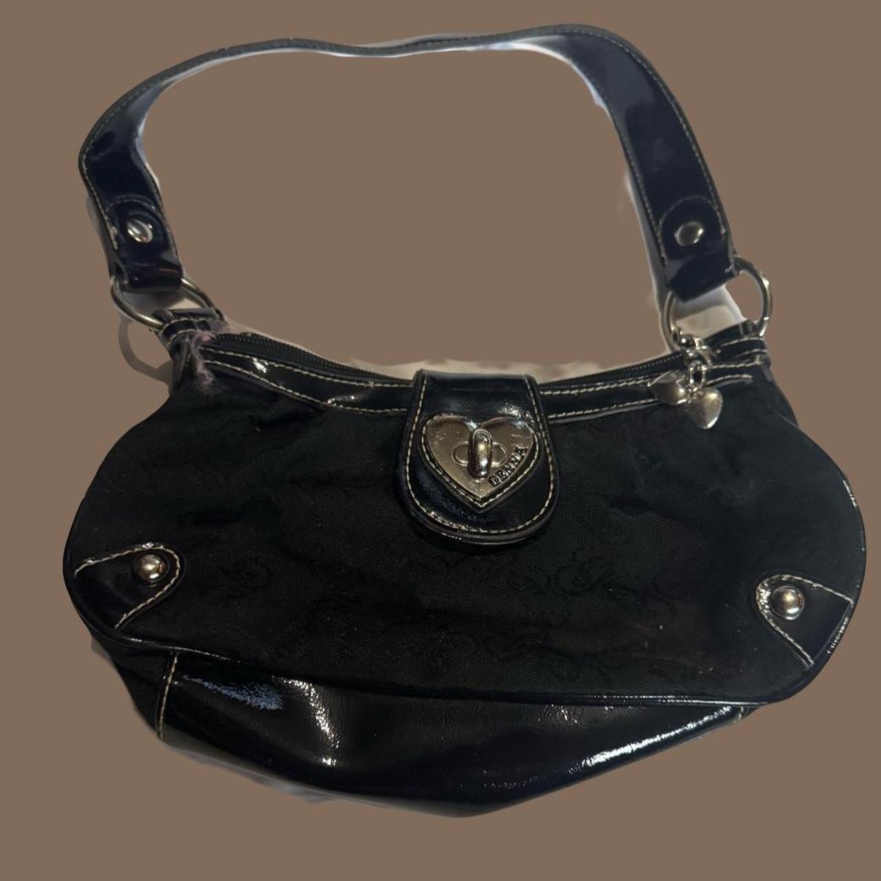 Genna brand punk style bag, black on exterior and... | Depop