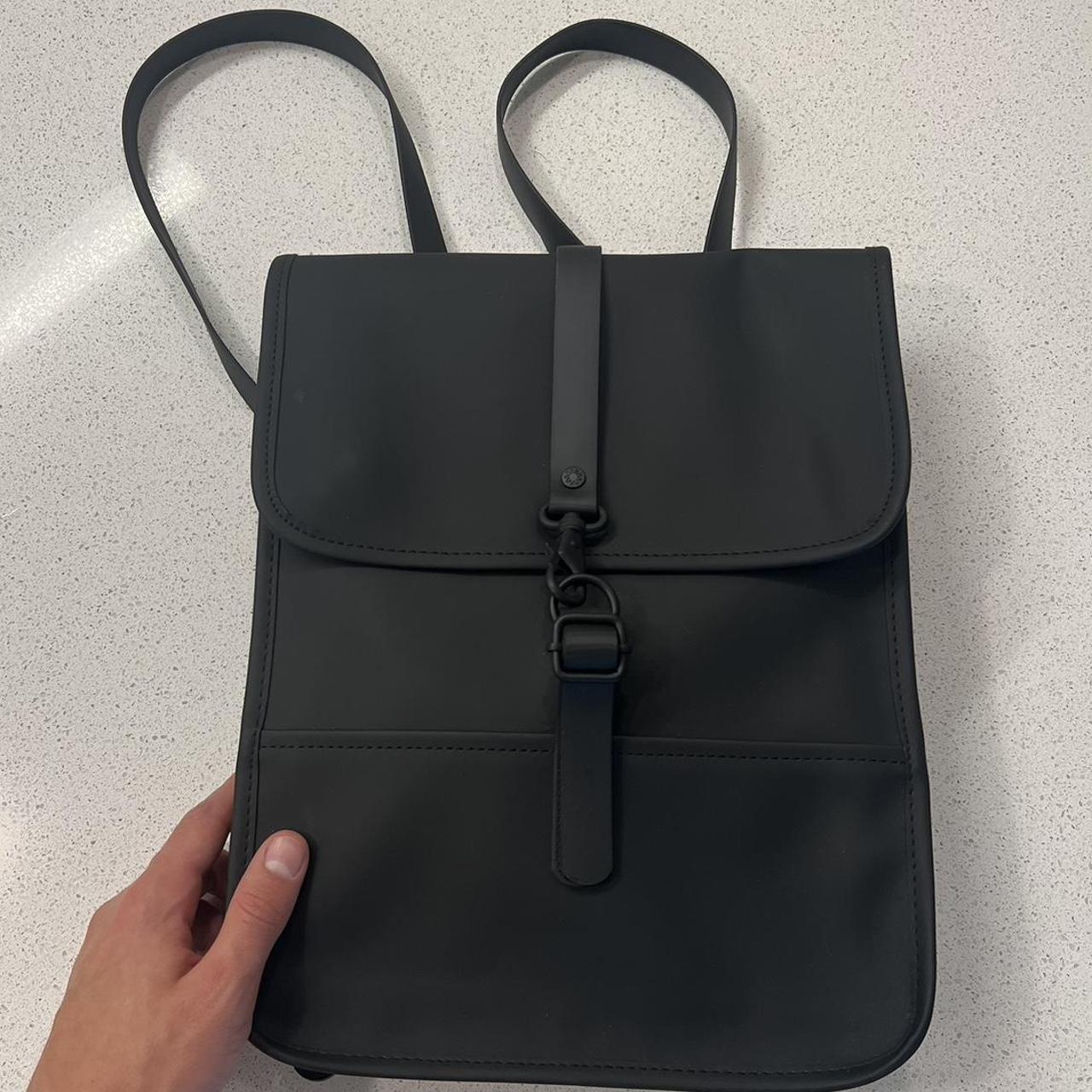 Rains mini back pack - current model- worn once -... - Depop