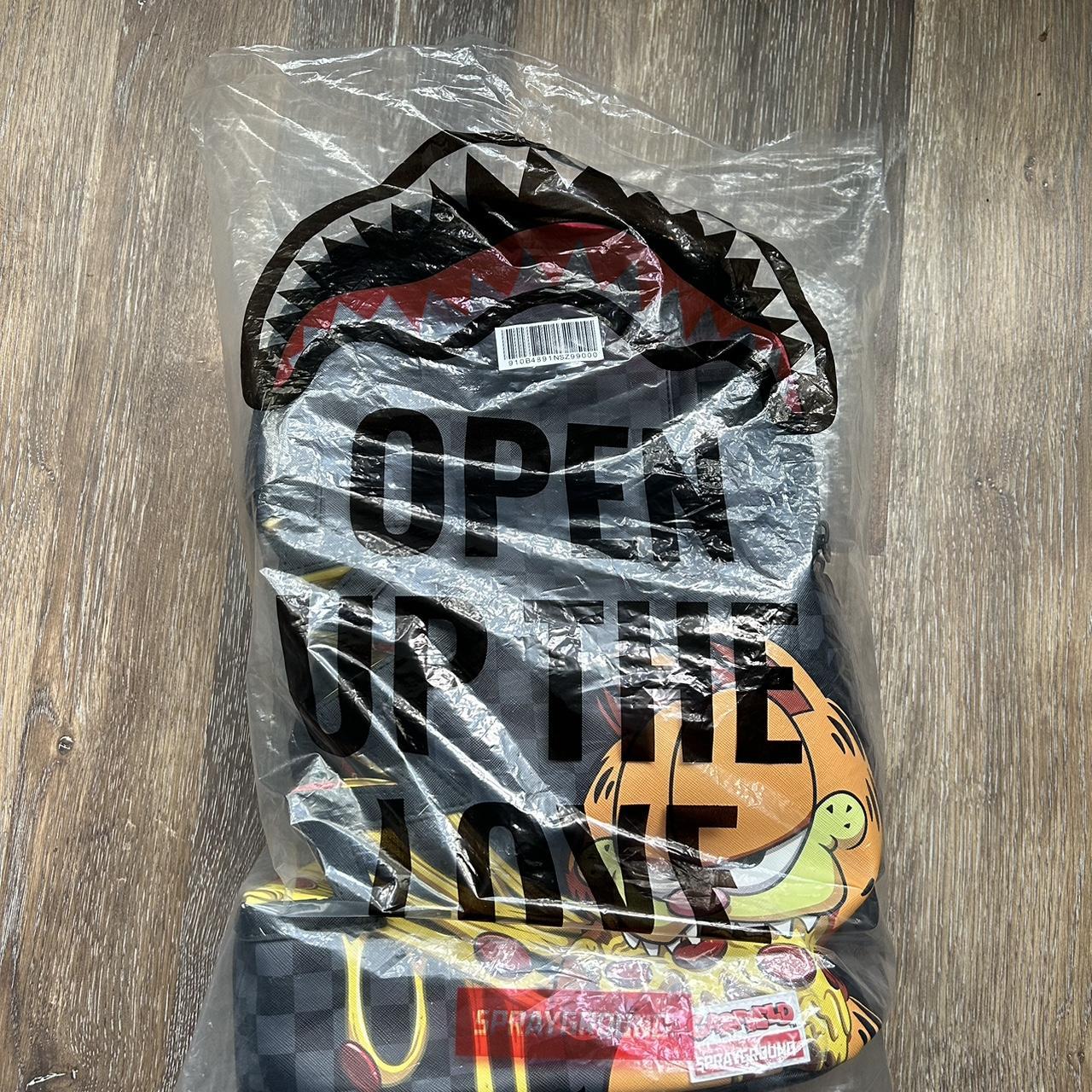 spray ground garfield limited edition - Depop