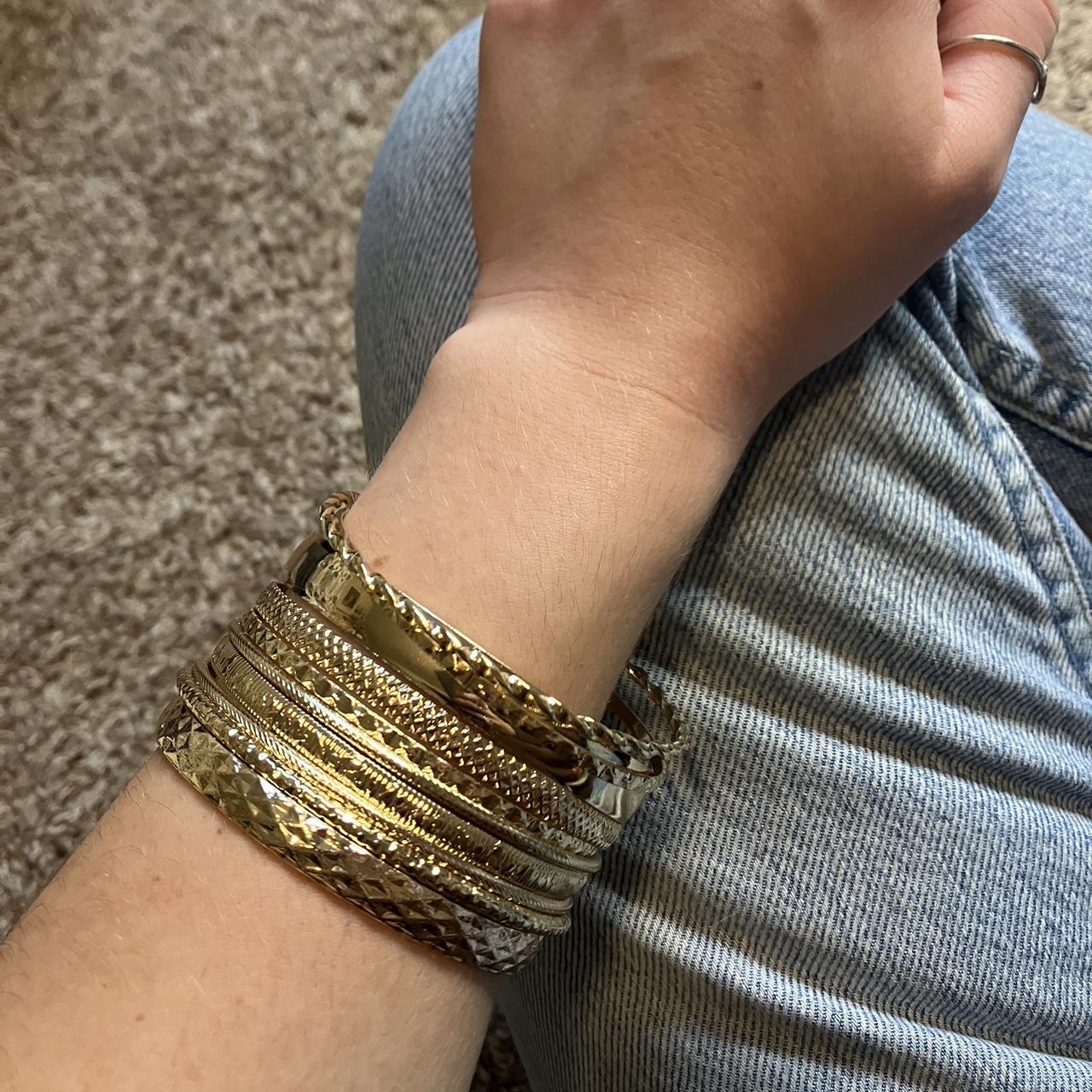Set of costume gold bangles. Cute, easy to squeeze on. - Depop