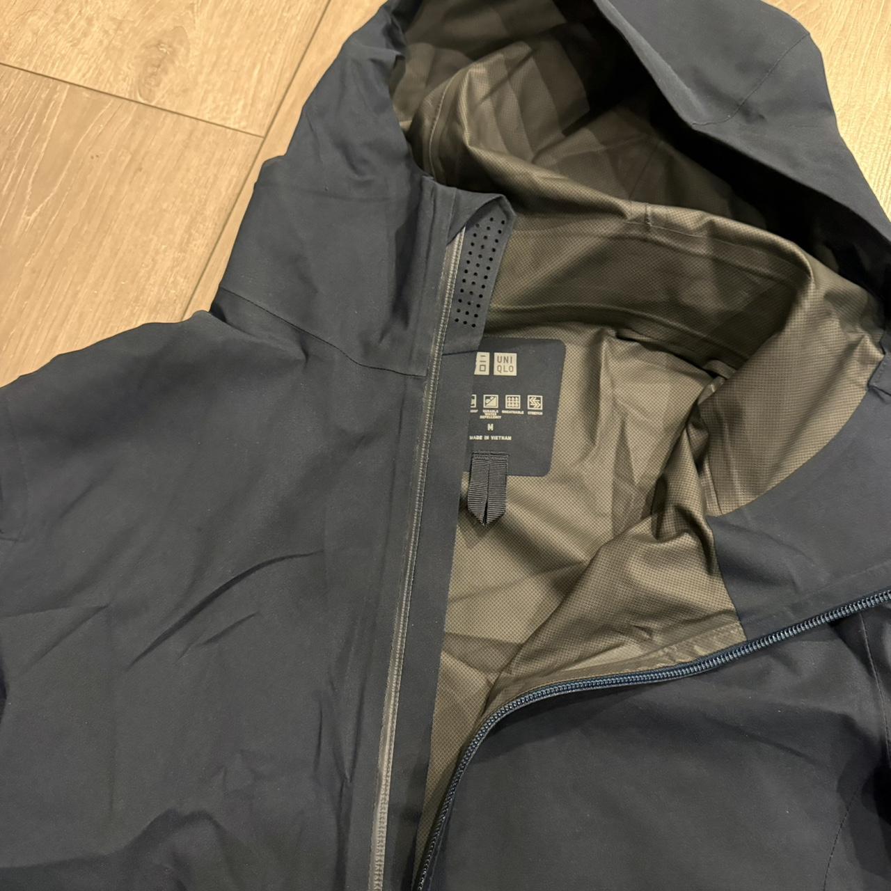 Blue Uniqlo waterproof windbreaker jacket... - Depop