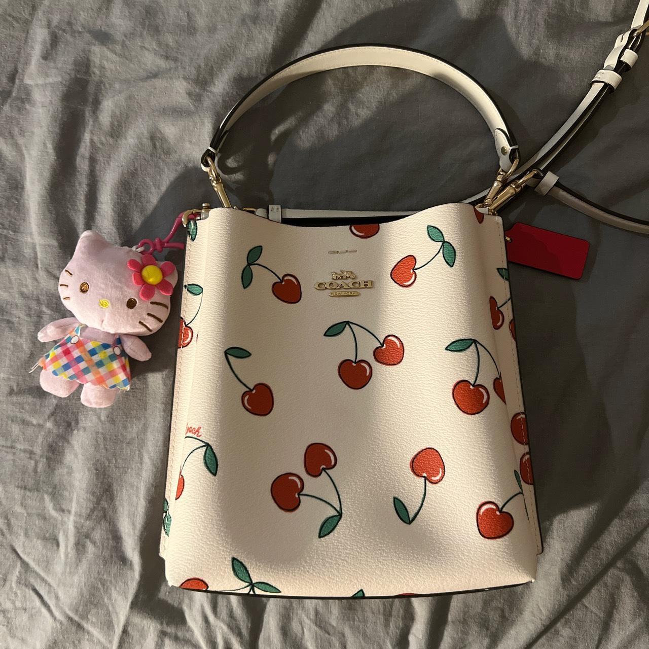 Coach Cherry Bucket Bag Hello Kitty keychain not... - Depop