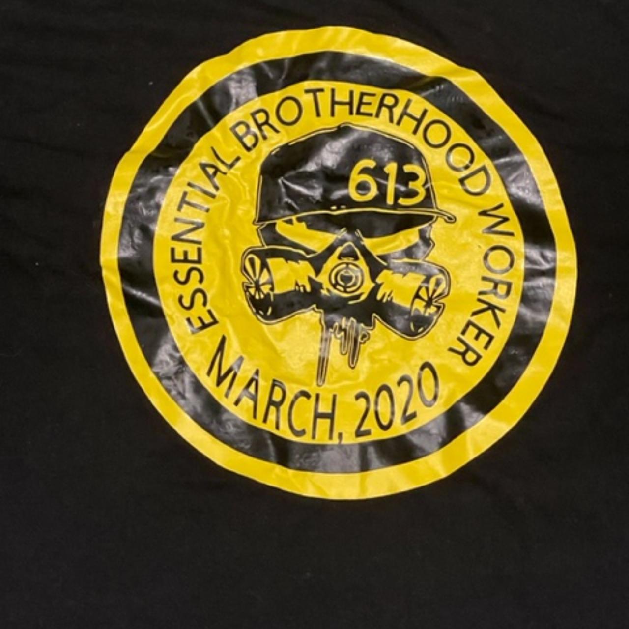 A black and yellow graphic tee with Covid 19... - Depop