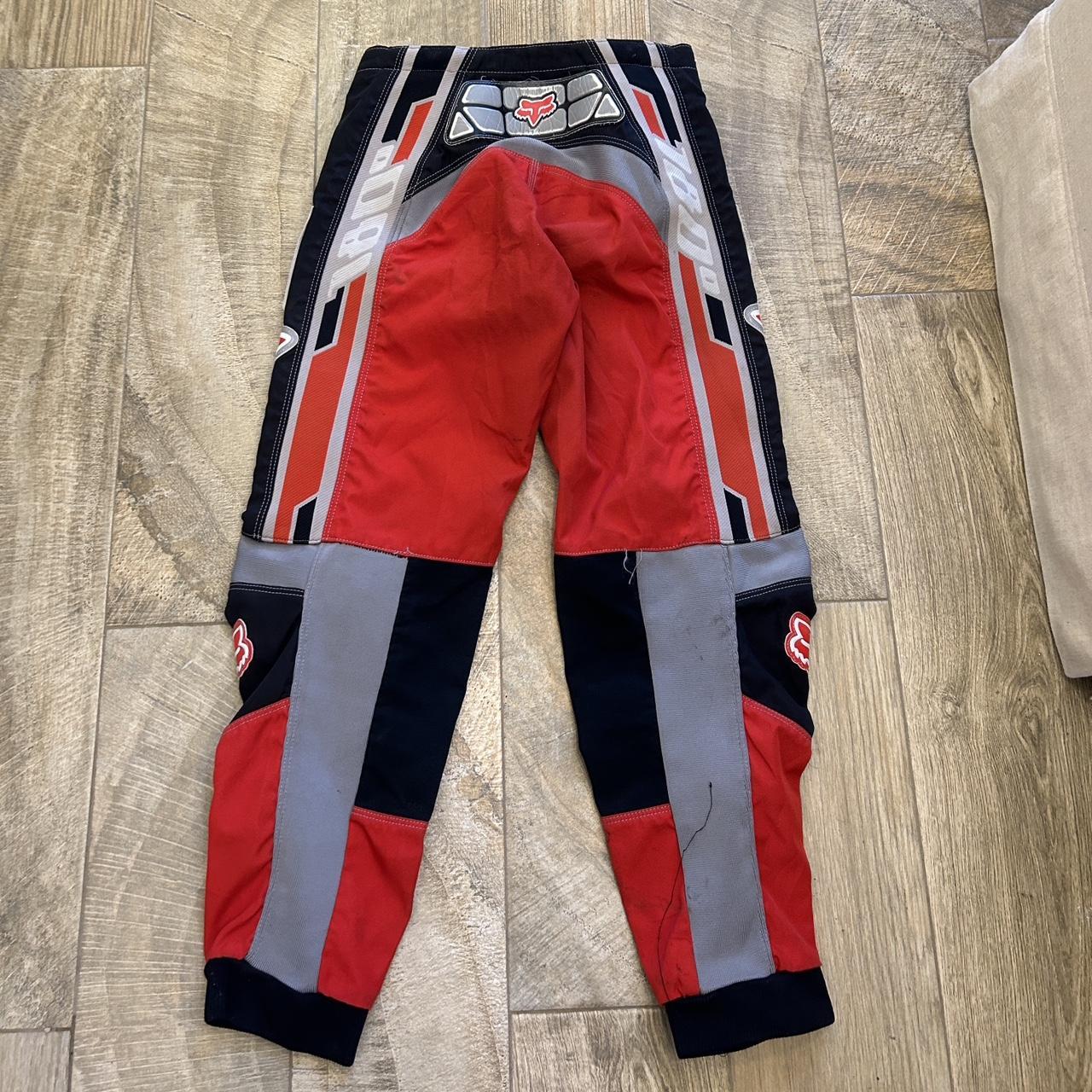 Fox Racing red and black trousers unsure about the size - Depop