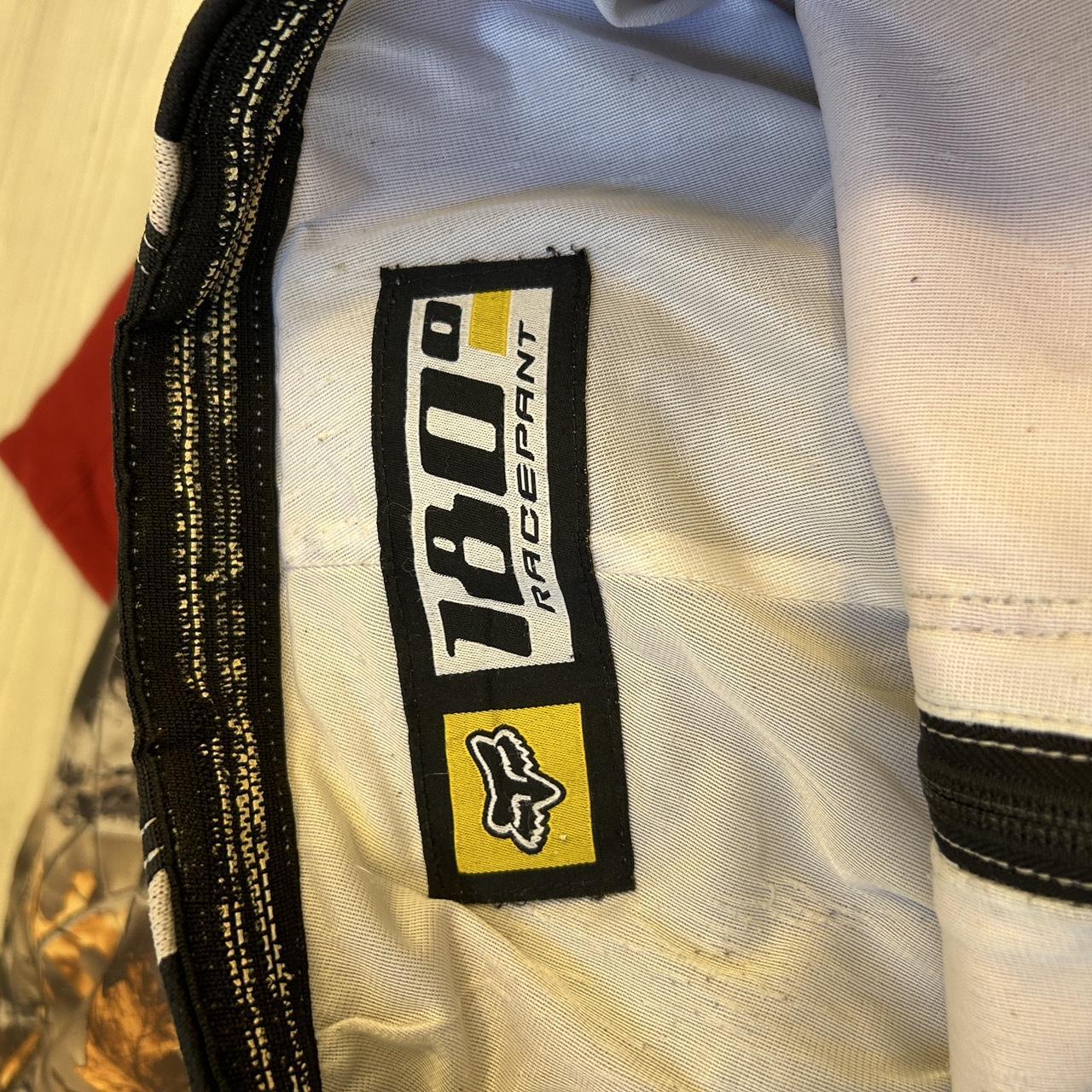 Fox Racing red and black trousers unsure about the size - Depop