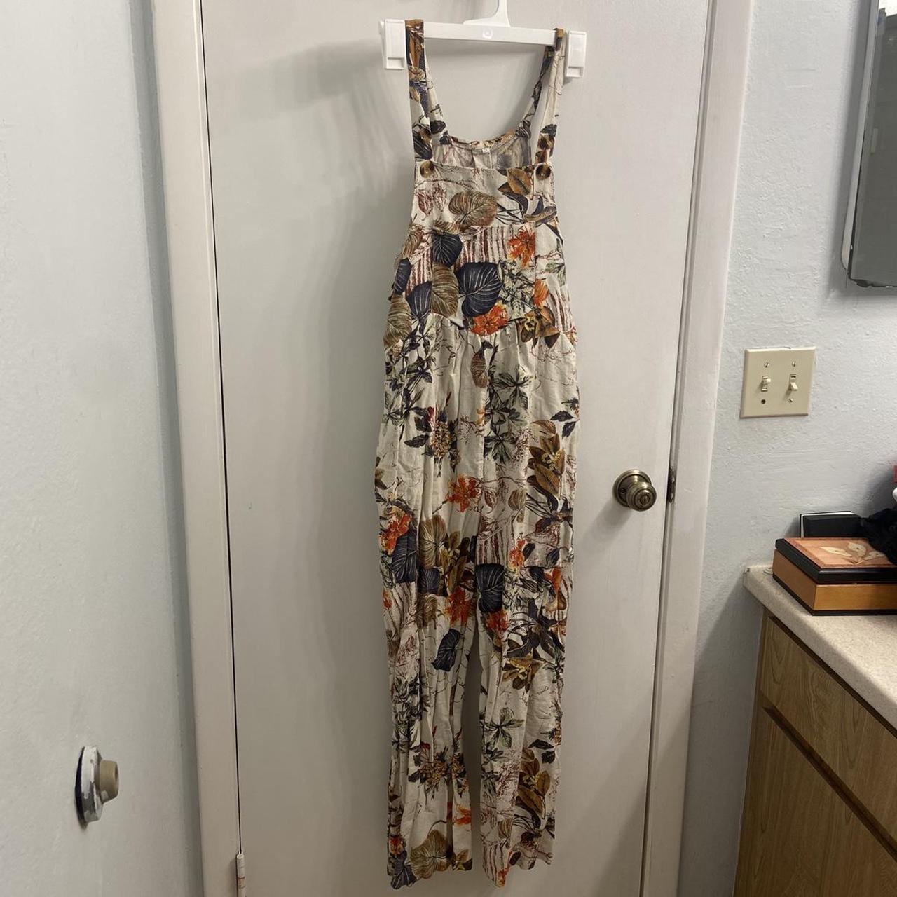 Floral overalls with two sized adjustable straps and... - Depop