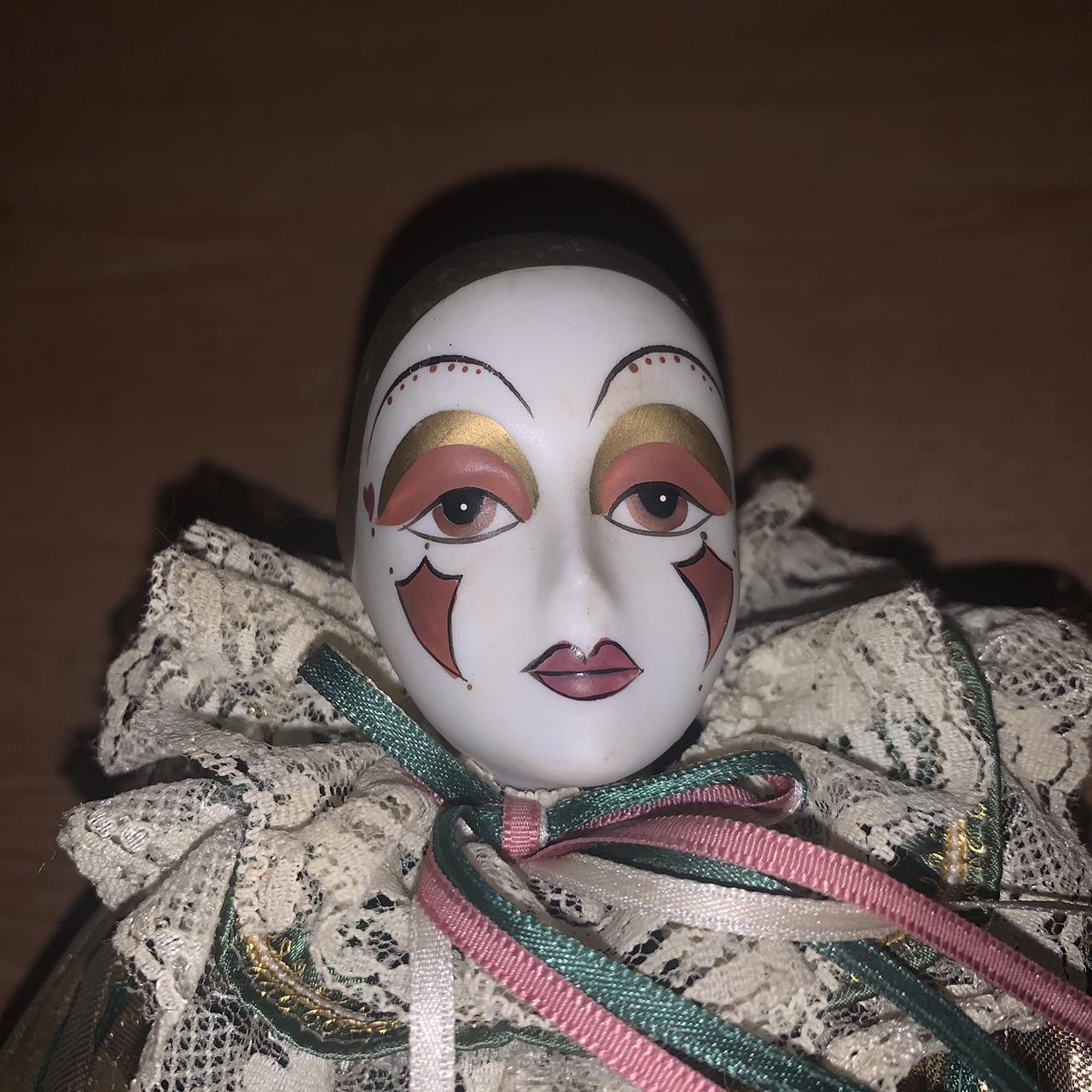 Porcelain green and yellow jester/clown. Decent... - Depop