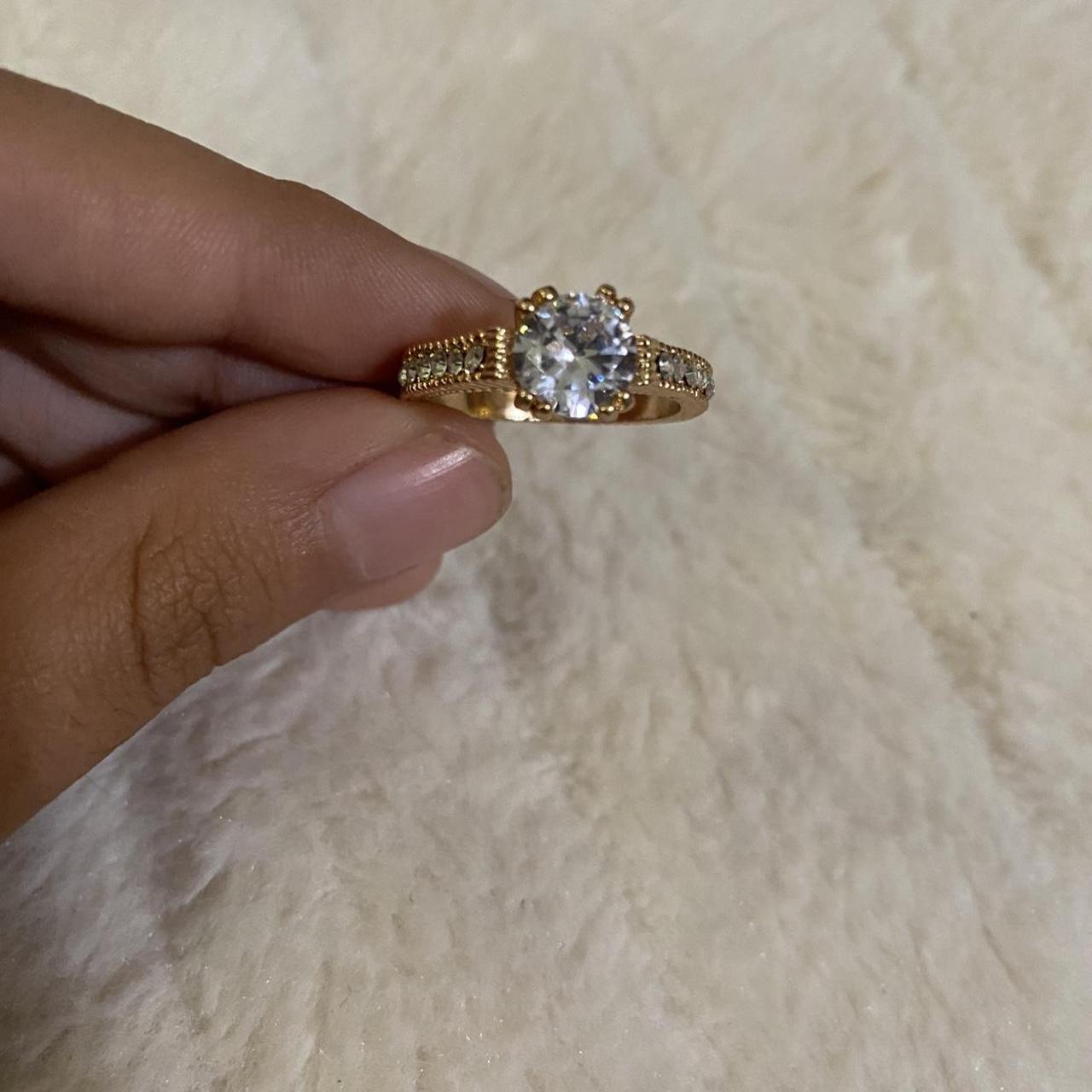 fake golden ring 😍 i don’t know the size😓🥲 Dont buy... - Depop
