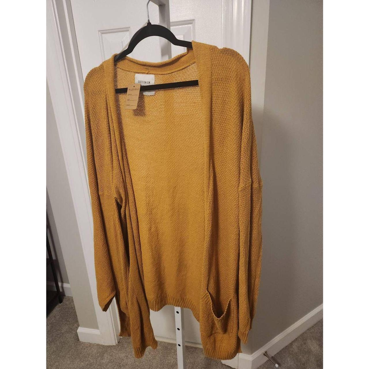 Cozy, knit open tunic length cardigan with pockets - Depop