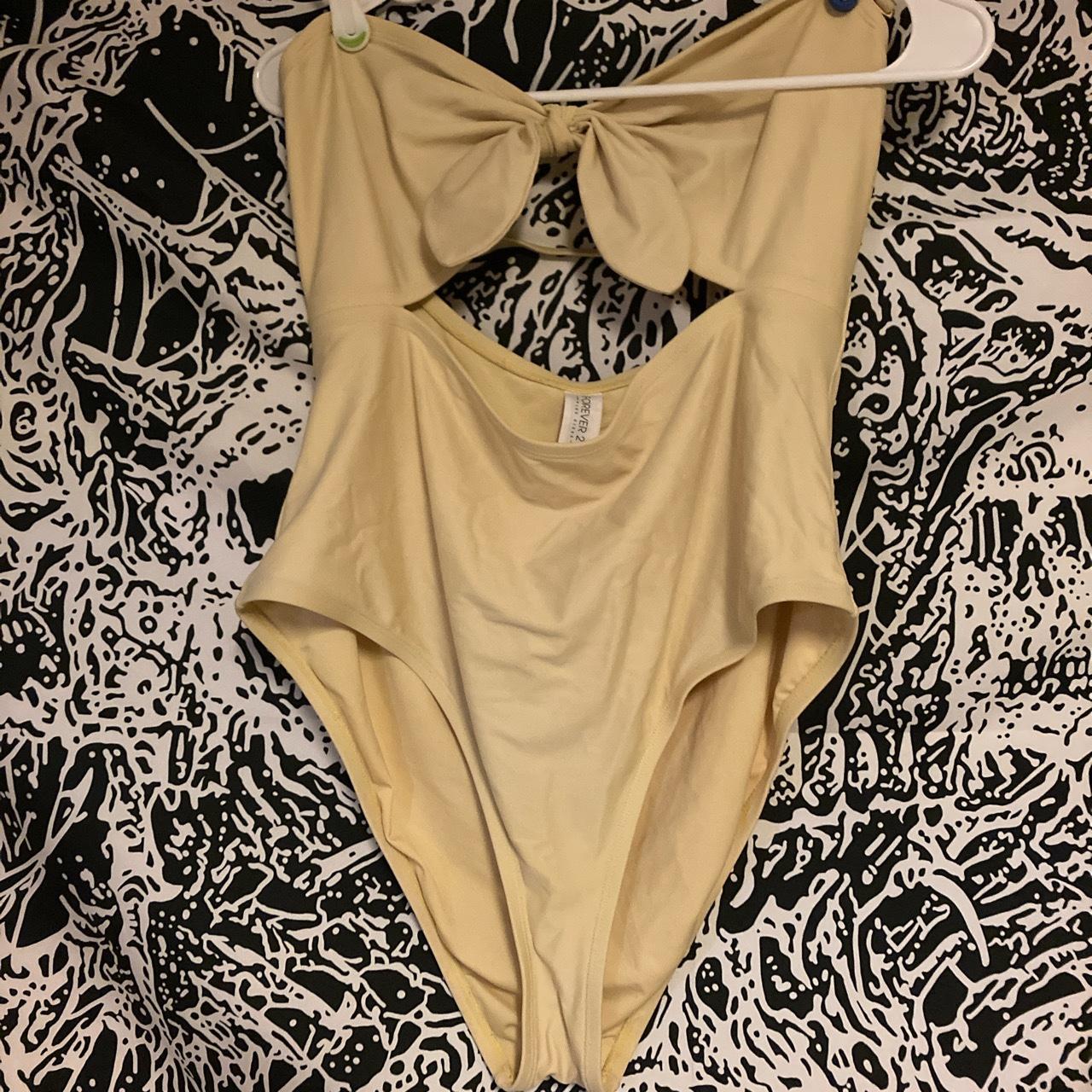 Tan/beige one piece, only worn a few times - Depop