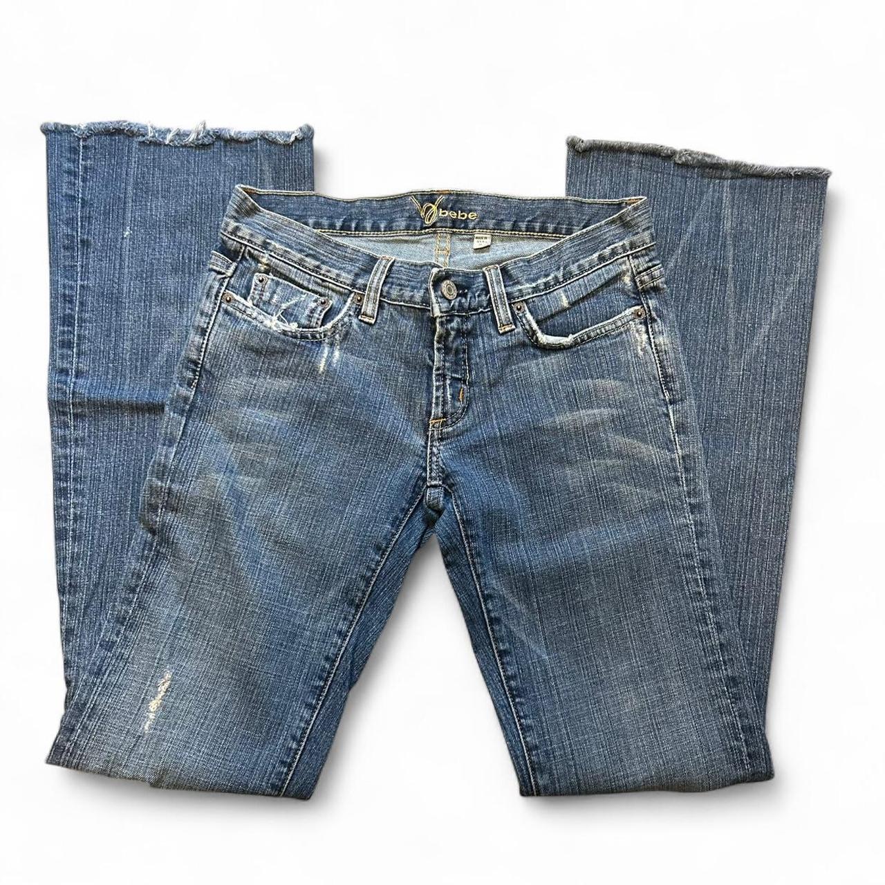 - 00’s Bebe Low rise bootcut jeans with distressed... | Depop