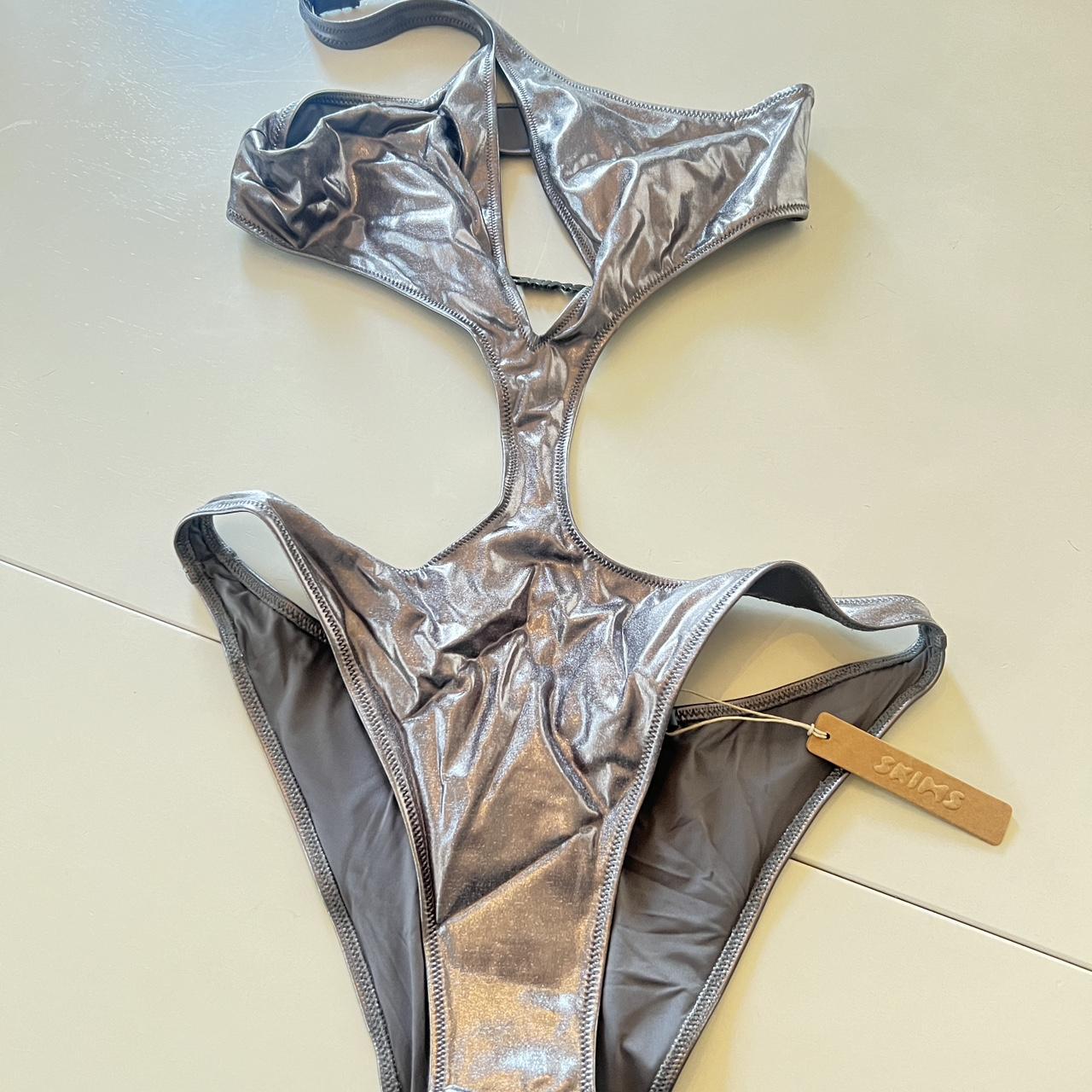 Silver metallic cut out one piece SKIMS swimsuit.... - Depop