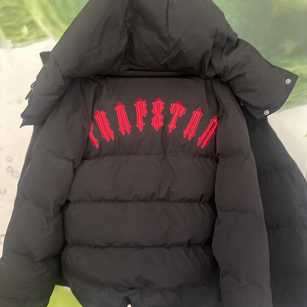 Red iron gate trapstar coat has a tear in the right... - Depop