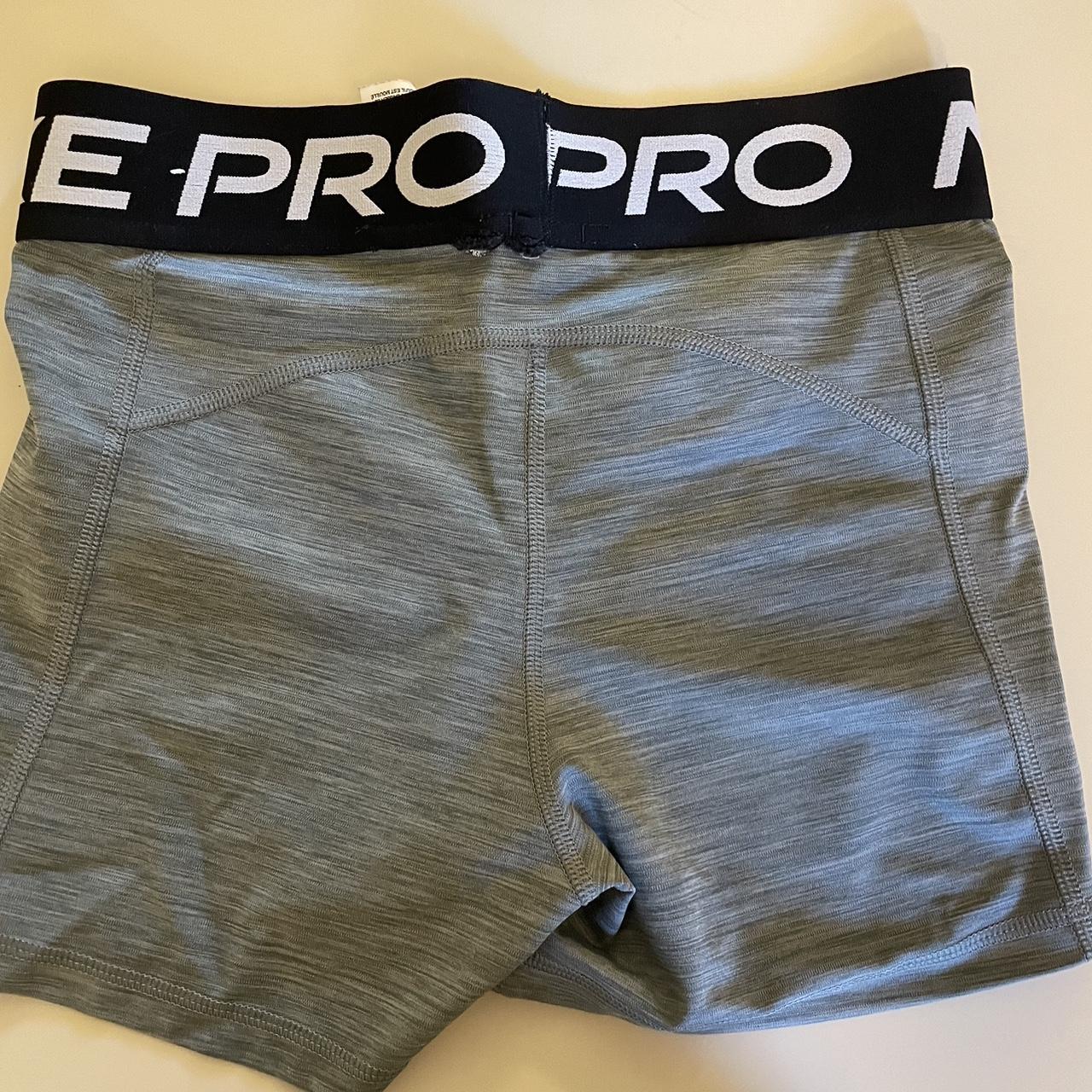 Grey Nike pros, size small, slight fraying in the back. | Depop