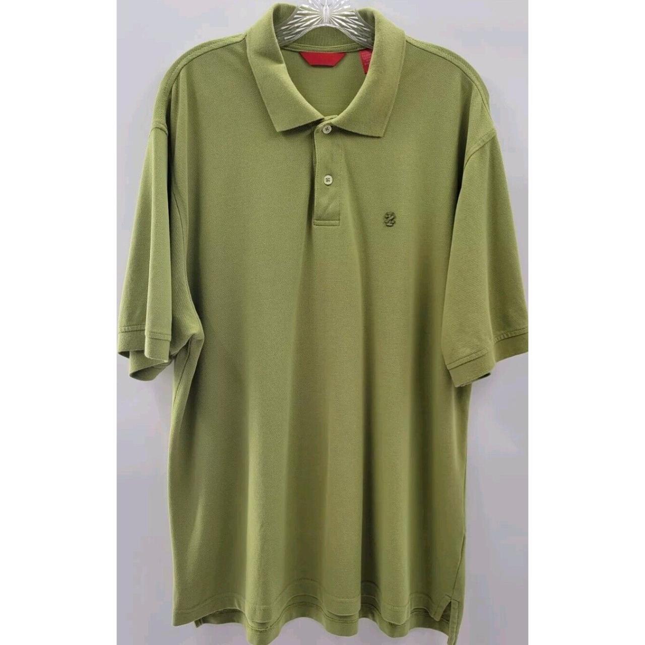 This light green Izod polo shirt for men is a... - Depop