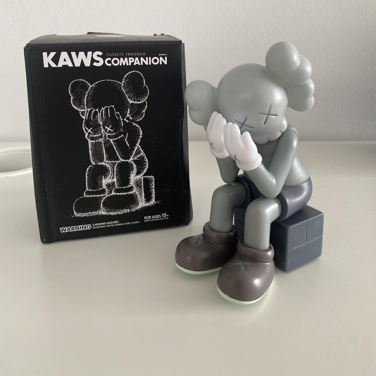 Sitting Kaws Figure Brand new, comes with box - Depop