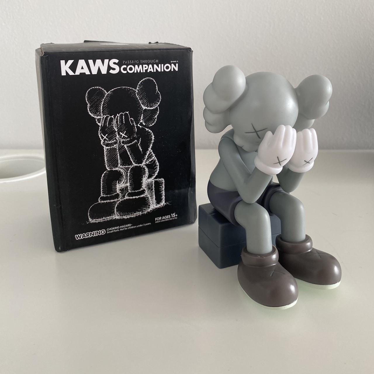 Sitting Kaws Figure Brand new, comes with box - Depop