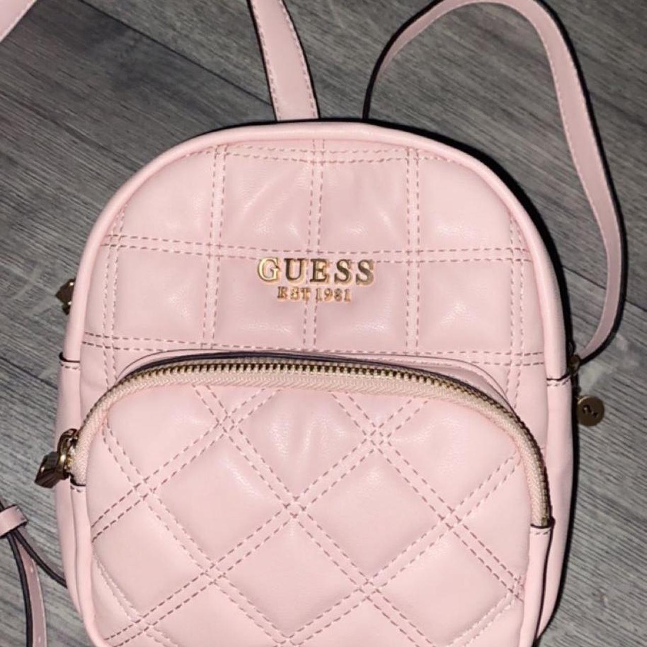 Pink GUESS mini backpack, bascially brand new,... - Depop