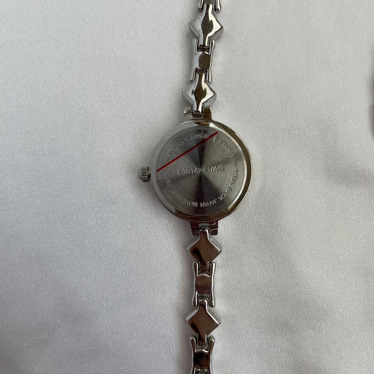 This vintage Avon watch offers the perfect subtle... | Depop