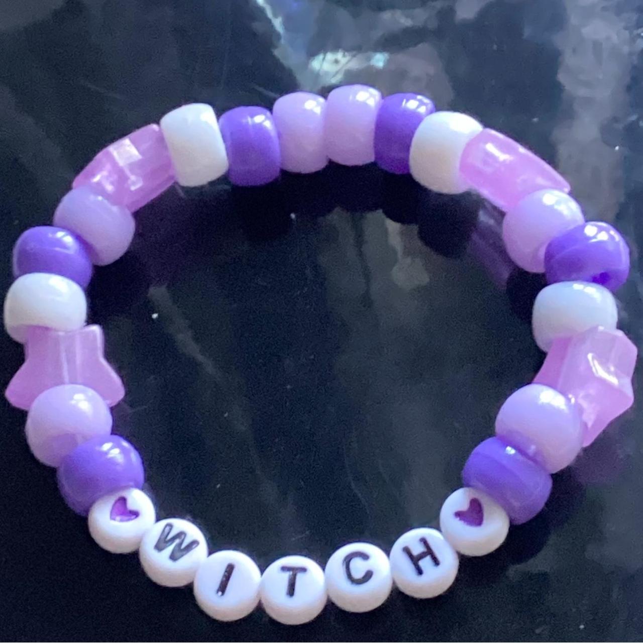 Purple kandi witch bracelet with purple glow in the... - Depop