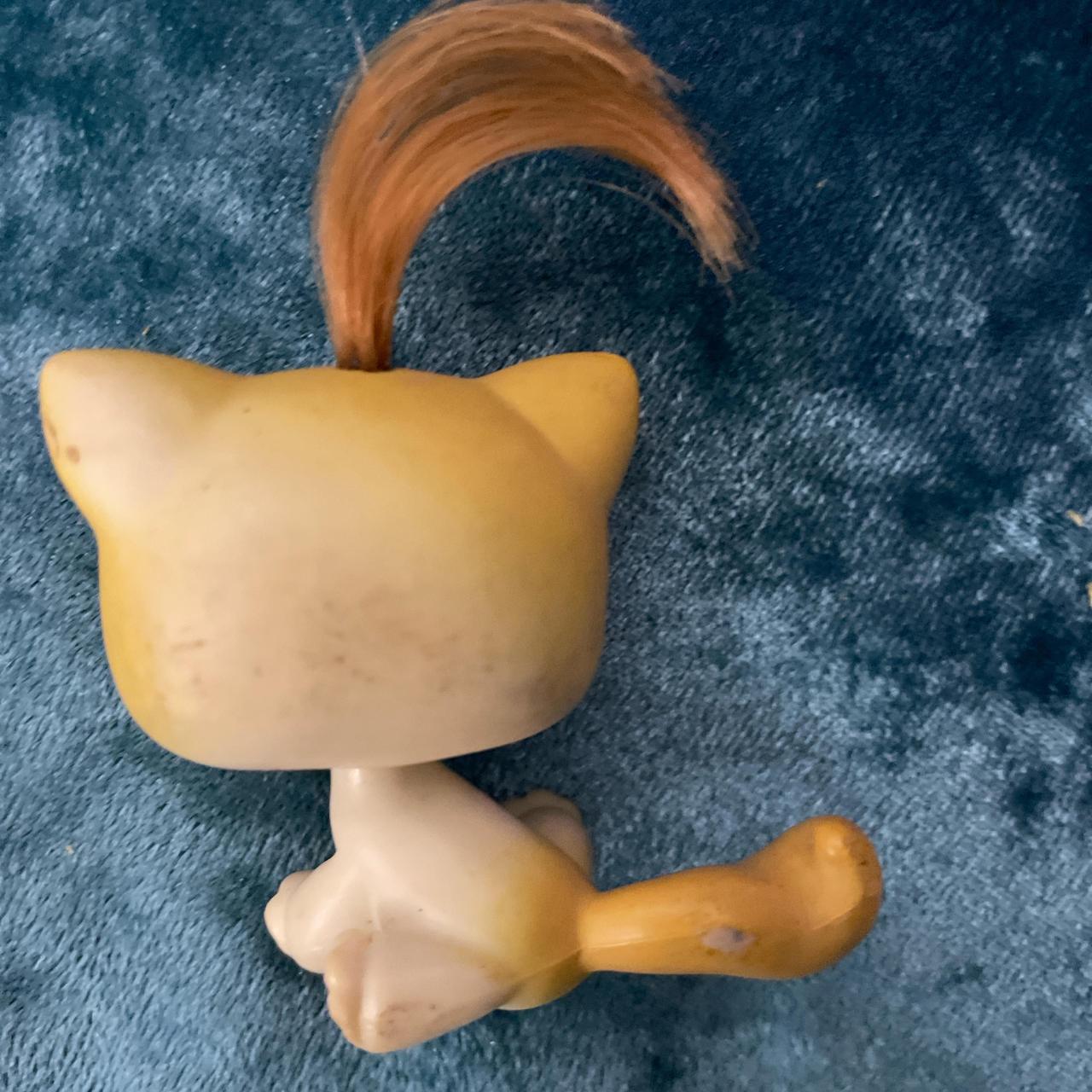 ON HOLD Lps sitting shorthair cat with hair sticking... | Depop