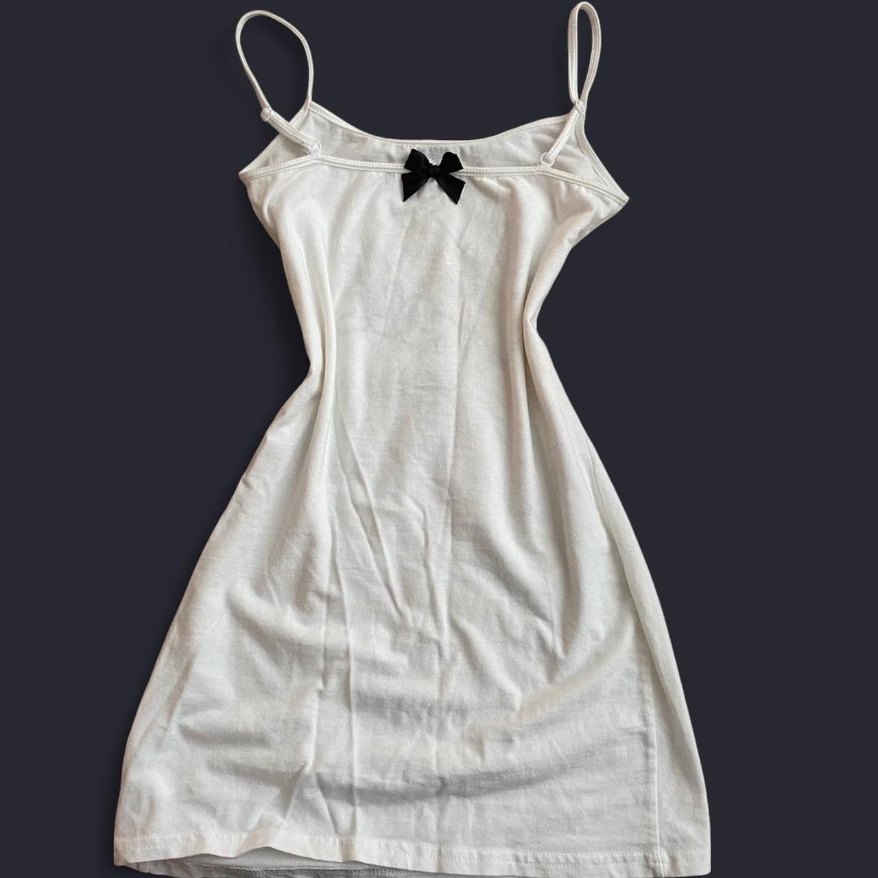 hand painted tank top? it’s long, i don’t know if... | Depop