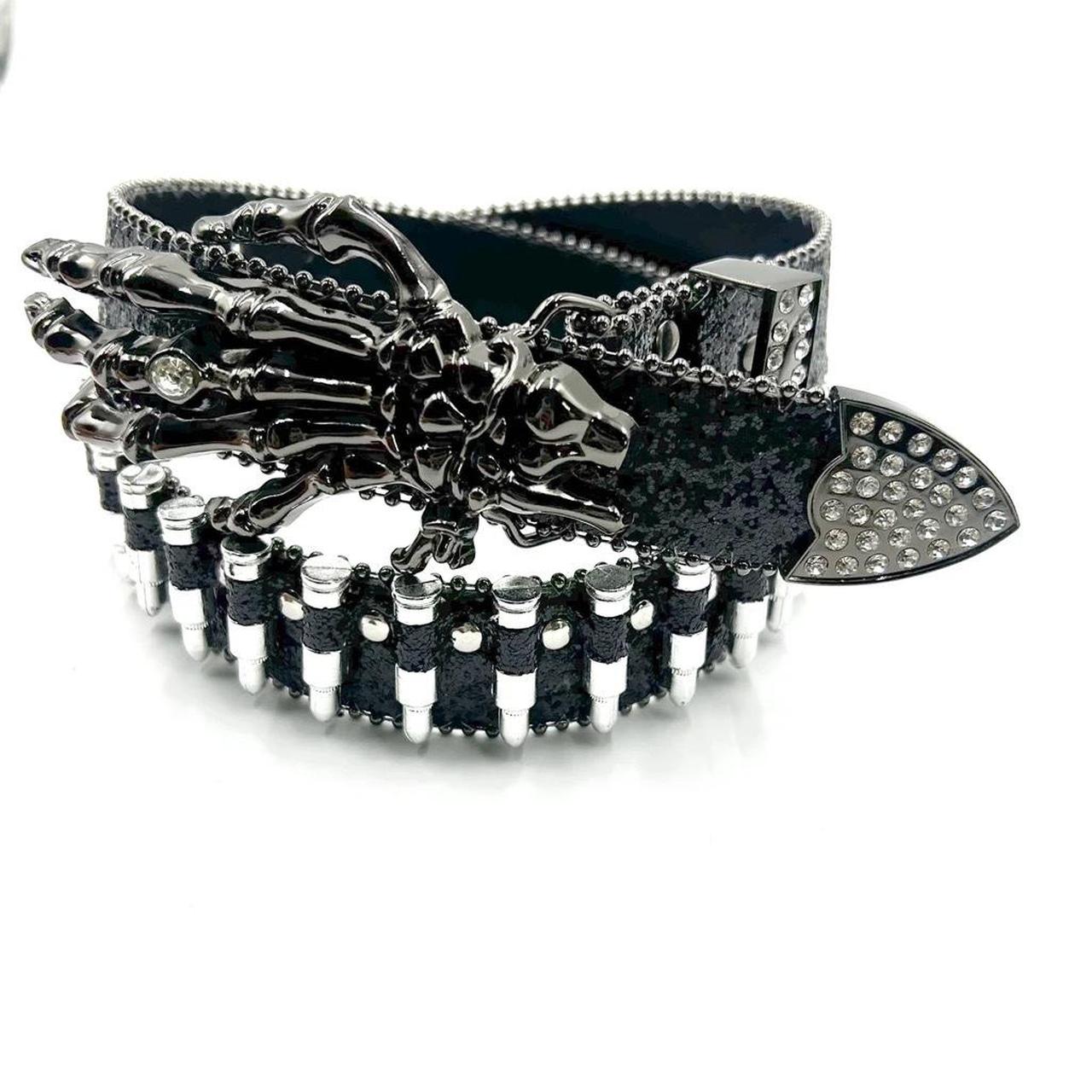 Black and silver skeleton belt, this belt features... - Depop