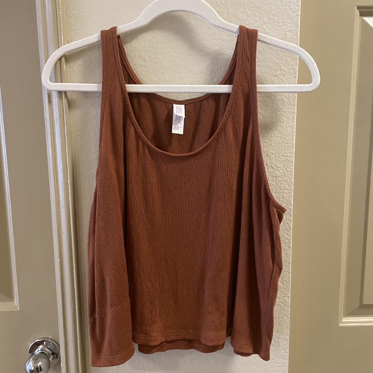 Burnt orange textured tank Sooo comfy Tag says... - Depop